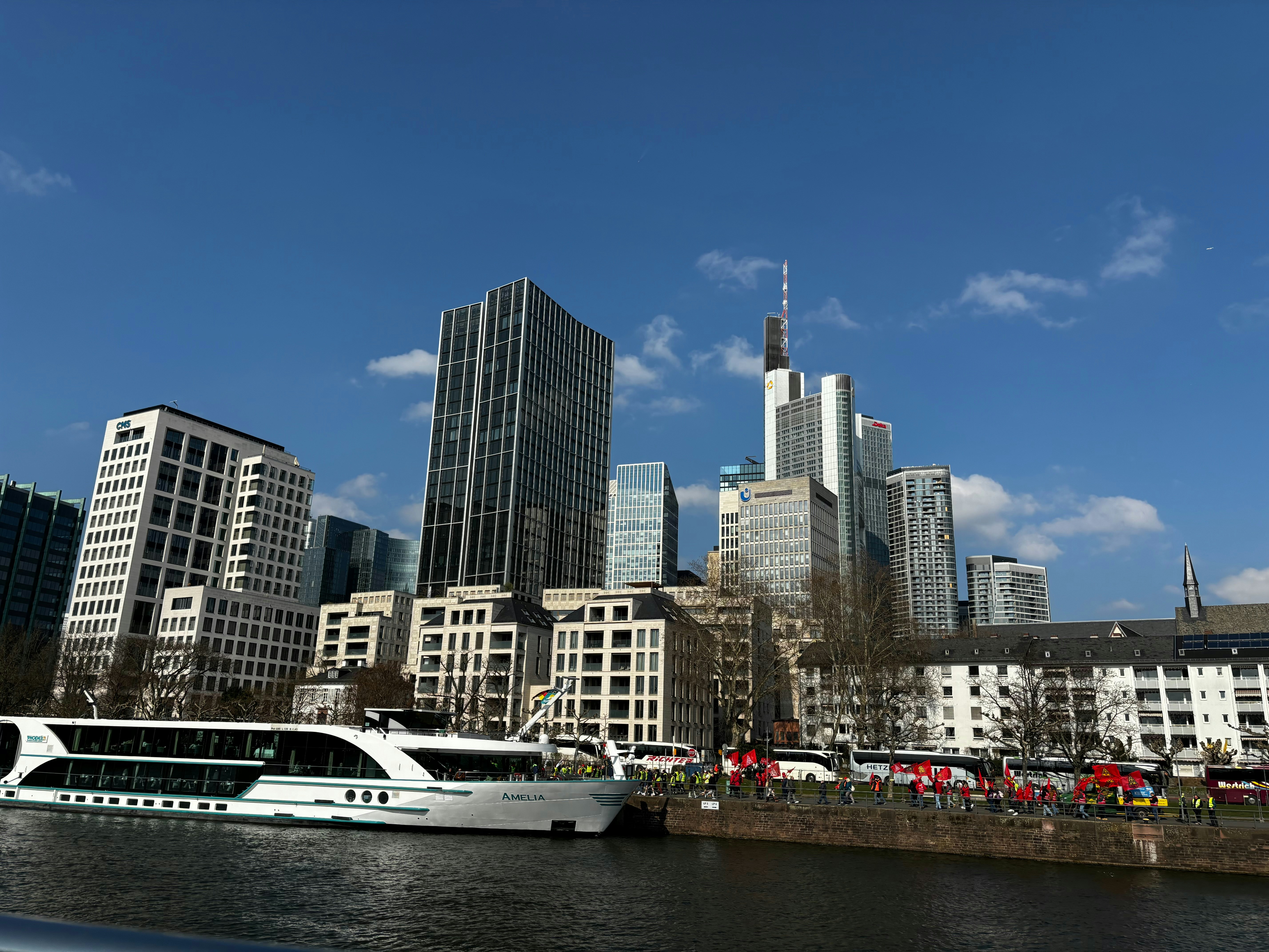 Harborfront Skyline Beneath a Clear Noon Sky