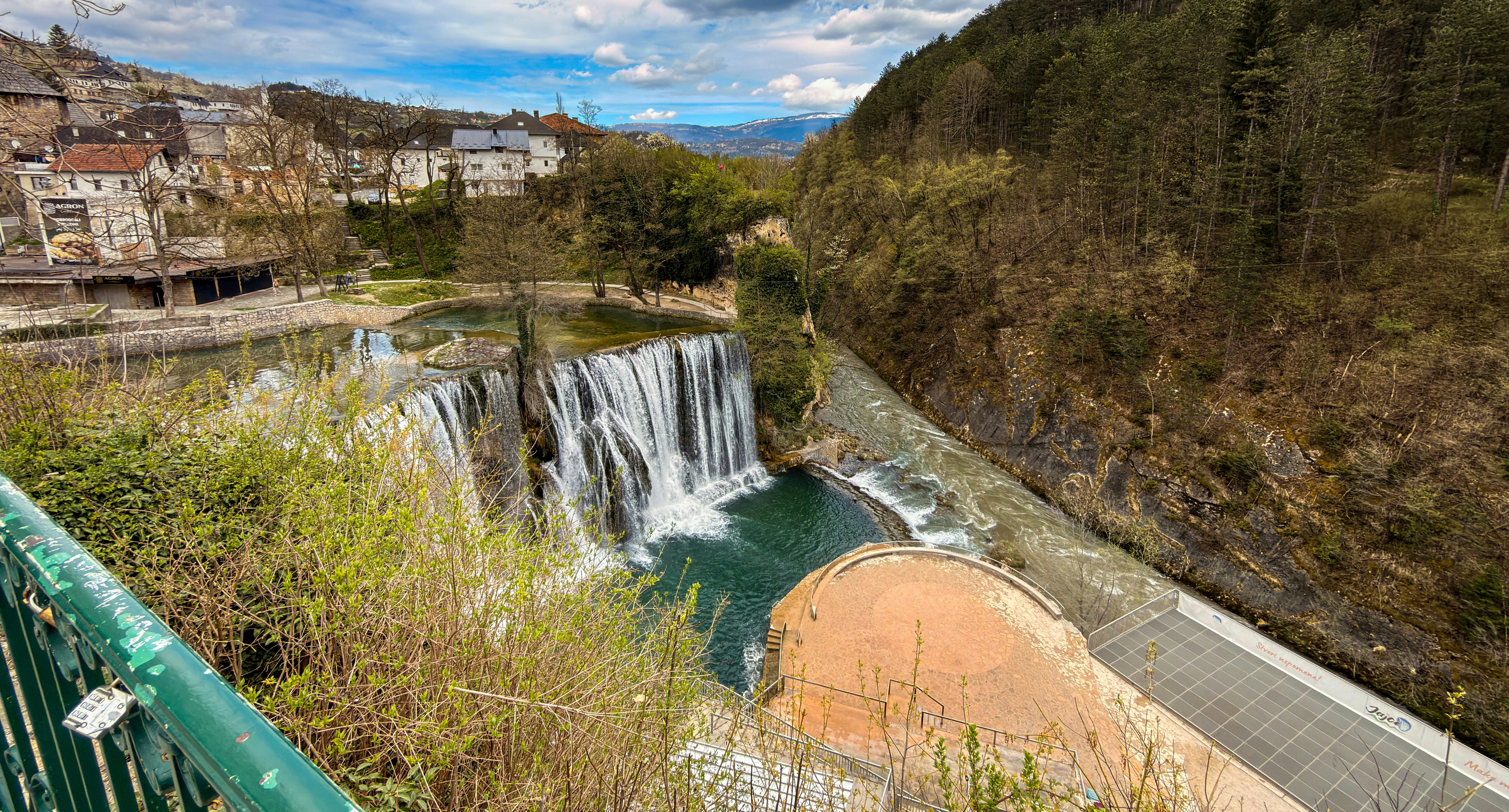 Cascade at the Edge: Urban Falls Meet Riverside Terrace