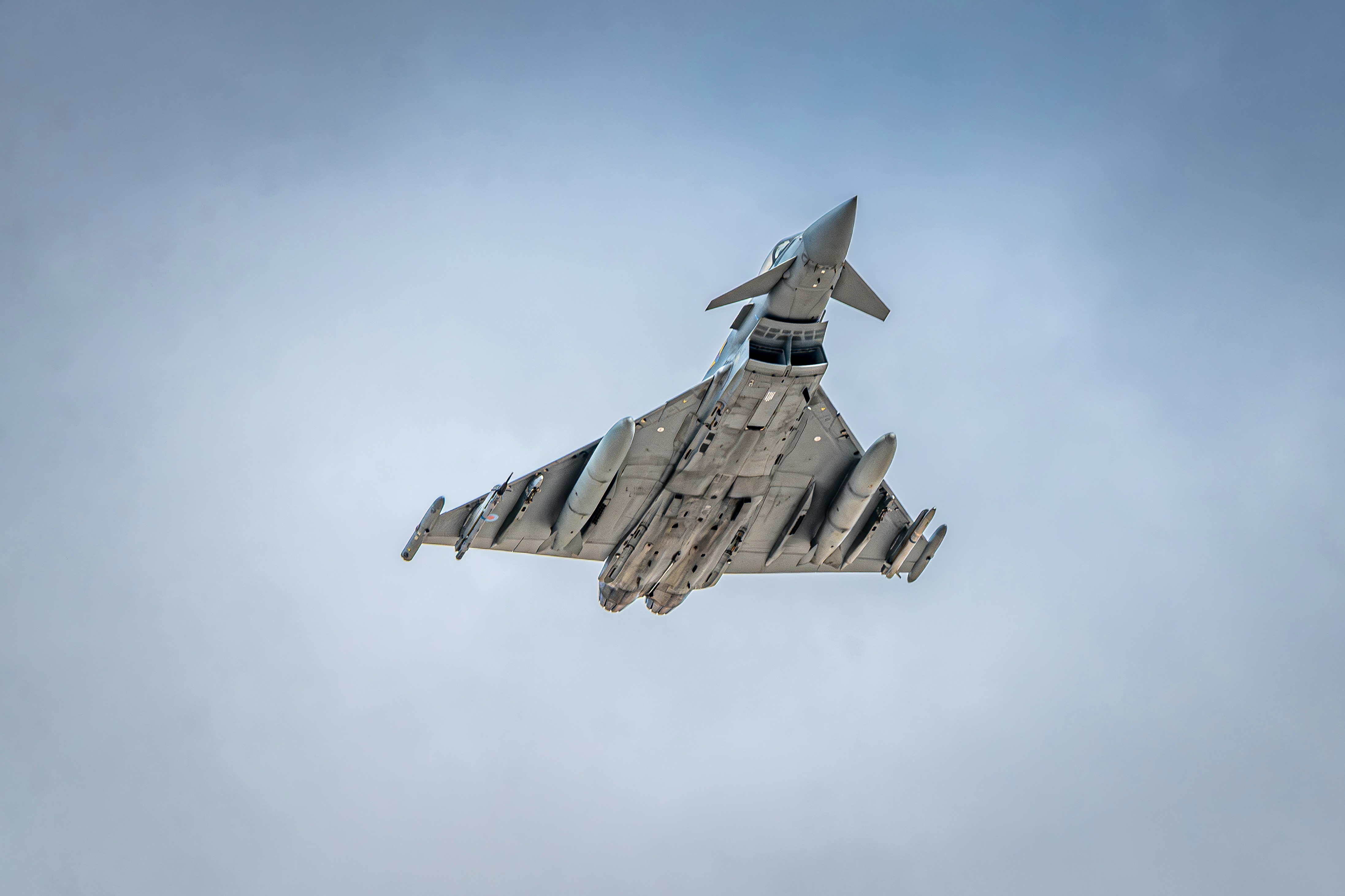 Soaring Precision: A Silent Gray Arrow in Skyward Pursuit