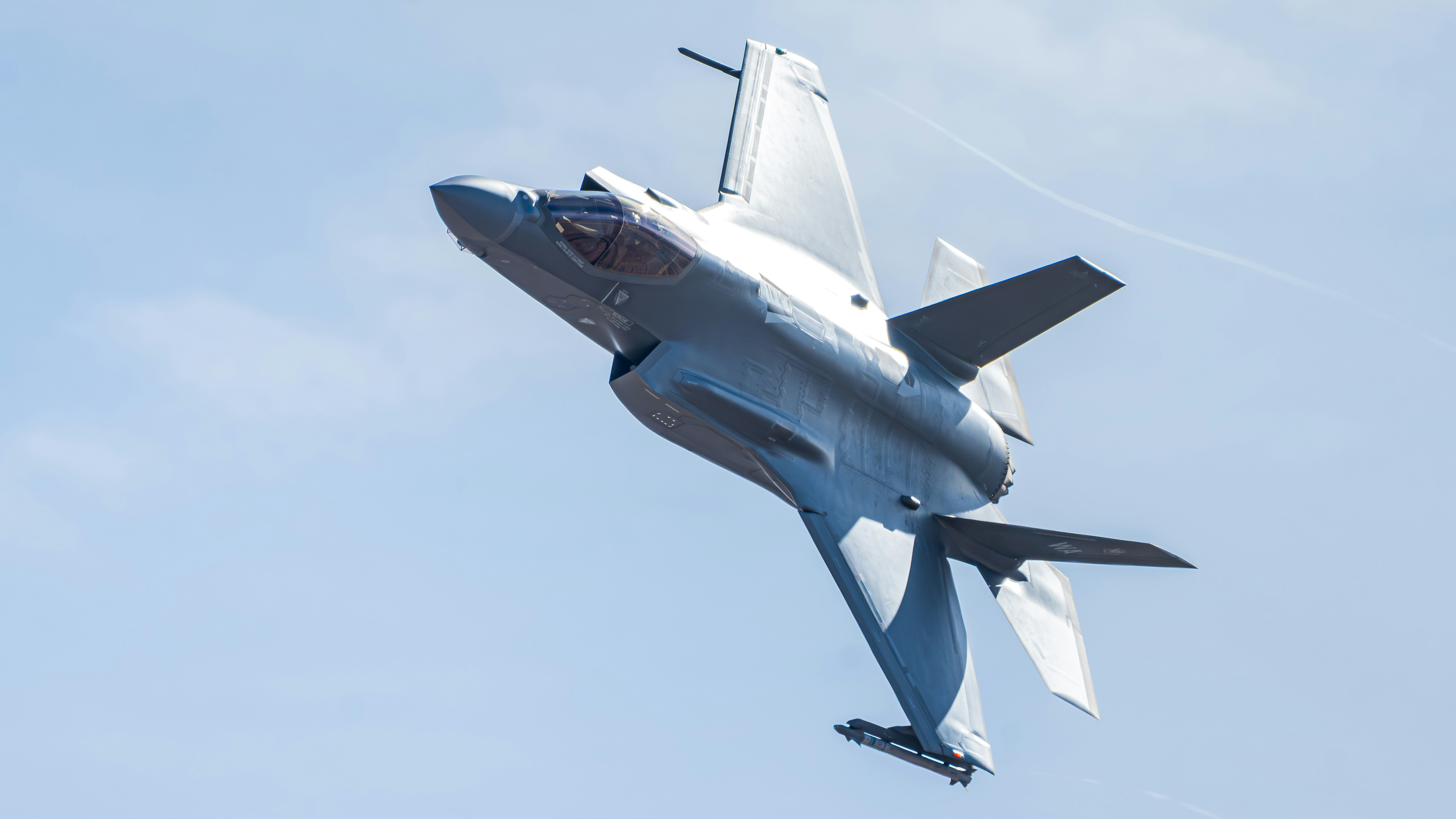 Skyward Razor: Ava-8 Navy Jet in a Tight Aileron Tilt