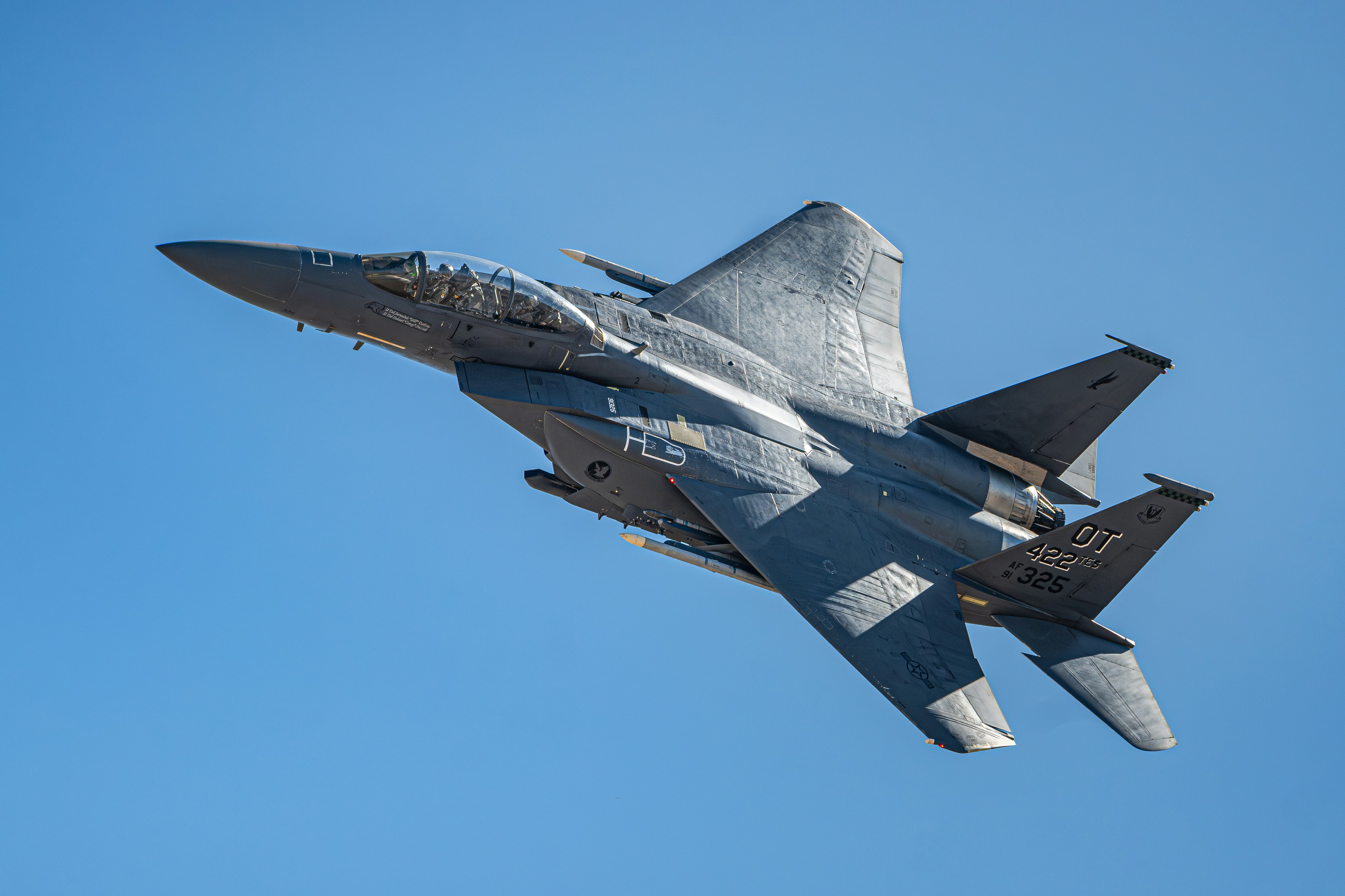 Shadow in the Sky: A Thunderjet Slicing Through a Clear Day
