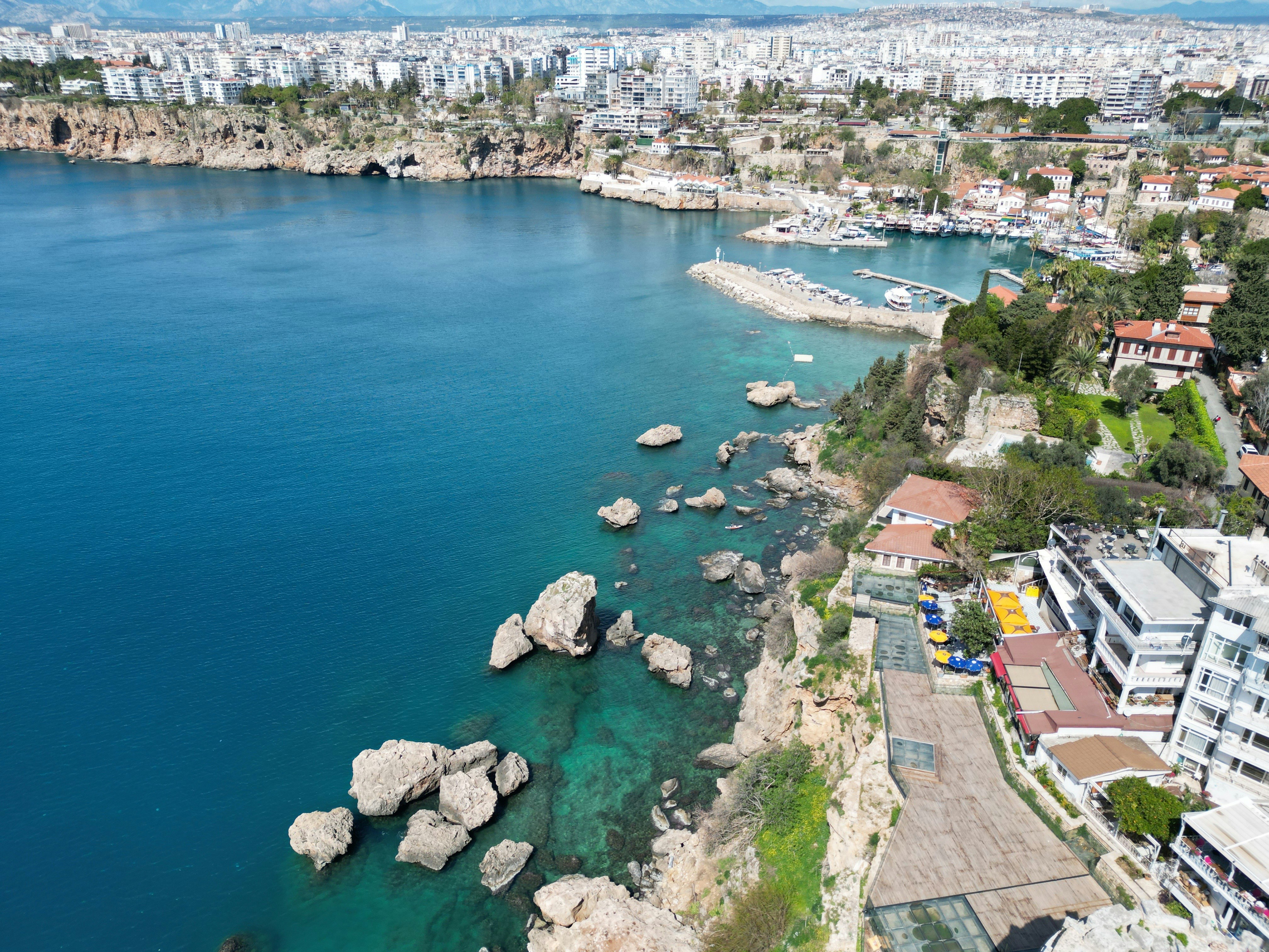 Coastal Cliffside Village: Turquoise Waters and Cliffside Homes