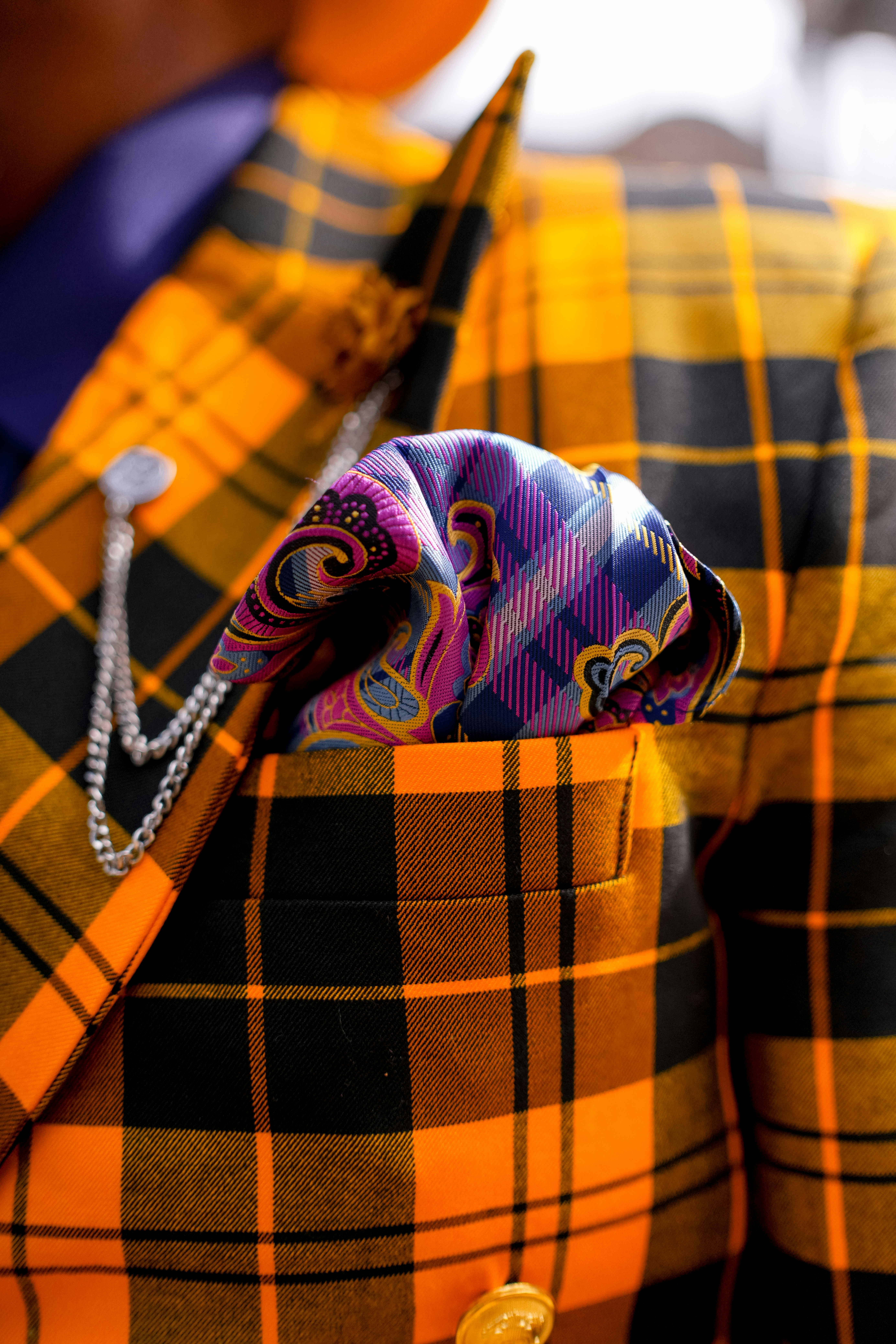 Luxe Contrast: The Bold Pocket Square in a Checkered Ensemble