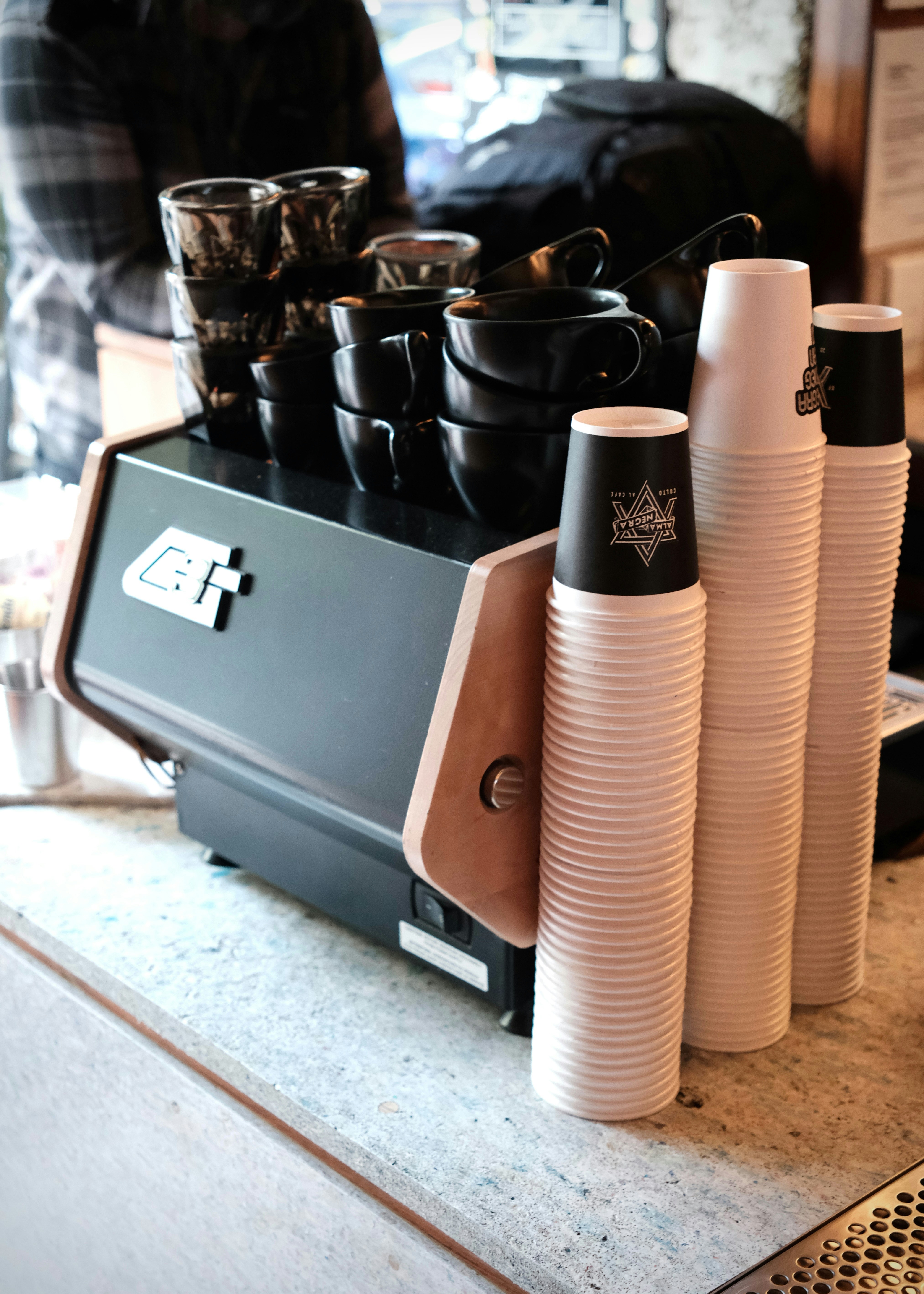 Steam and Stacks: A Café Espresso Station with Stacked Cups