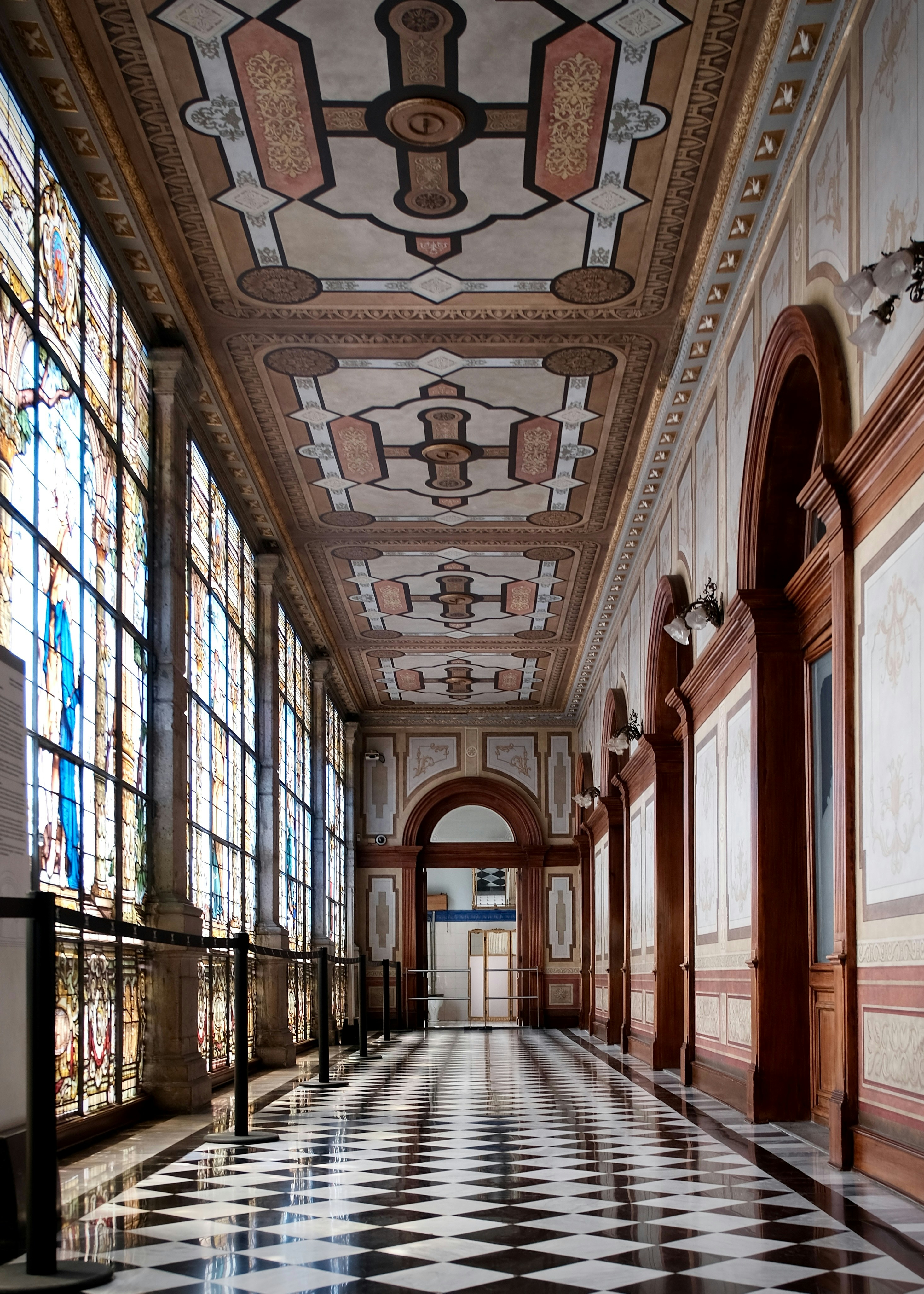 A Hall of Stained Glass and Echoed Geometry