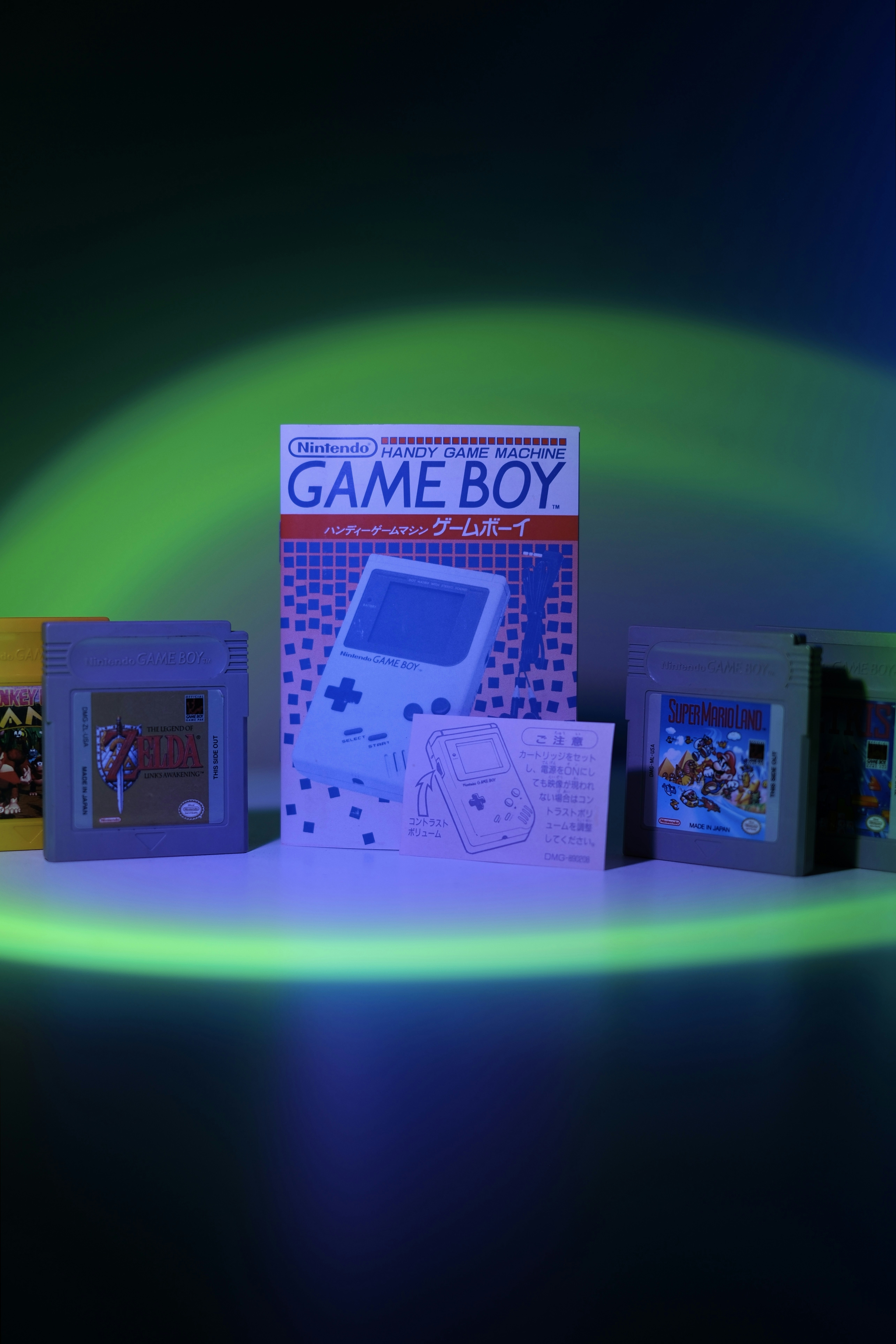 Retro Glow: Game Boy Display Under a Neon Arc