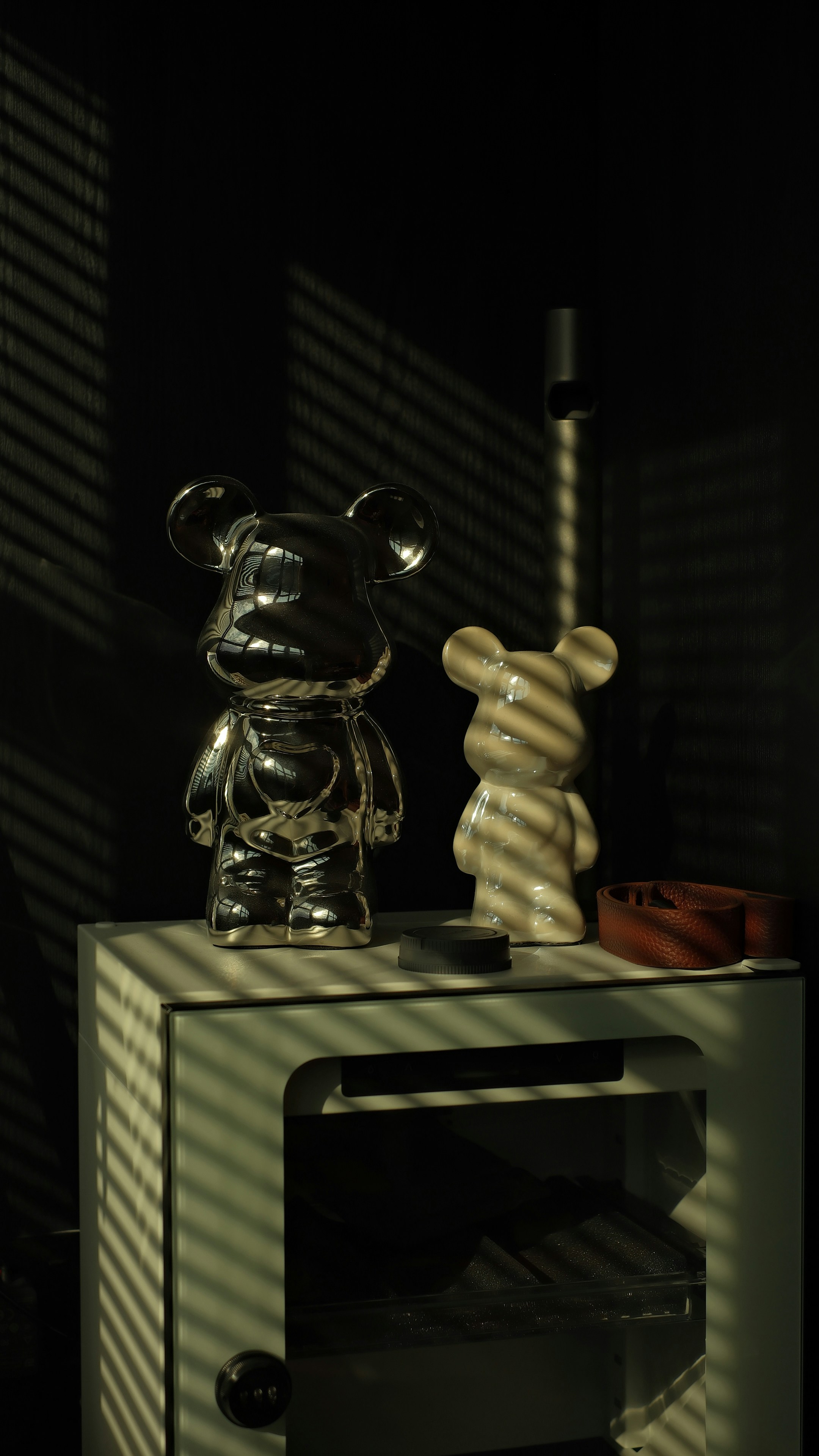 Glass Mice on a Shadowed Pedestal