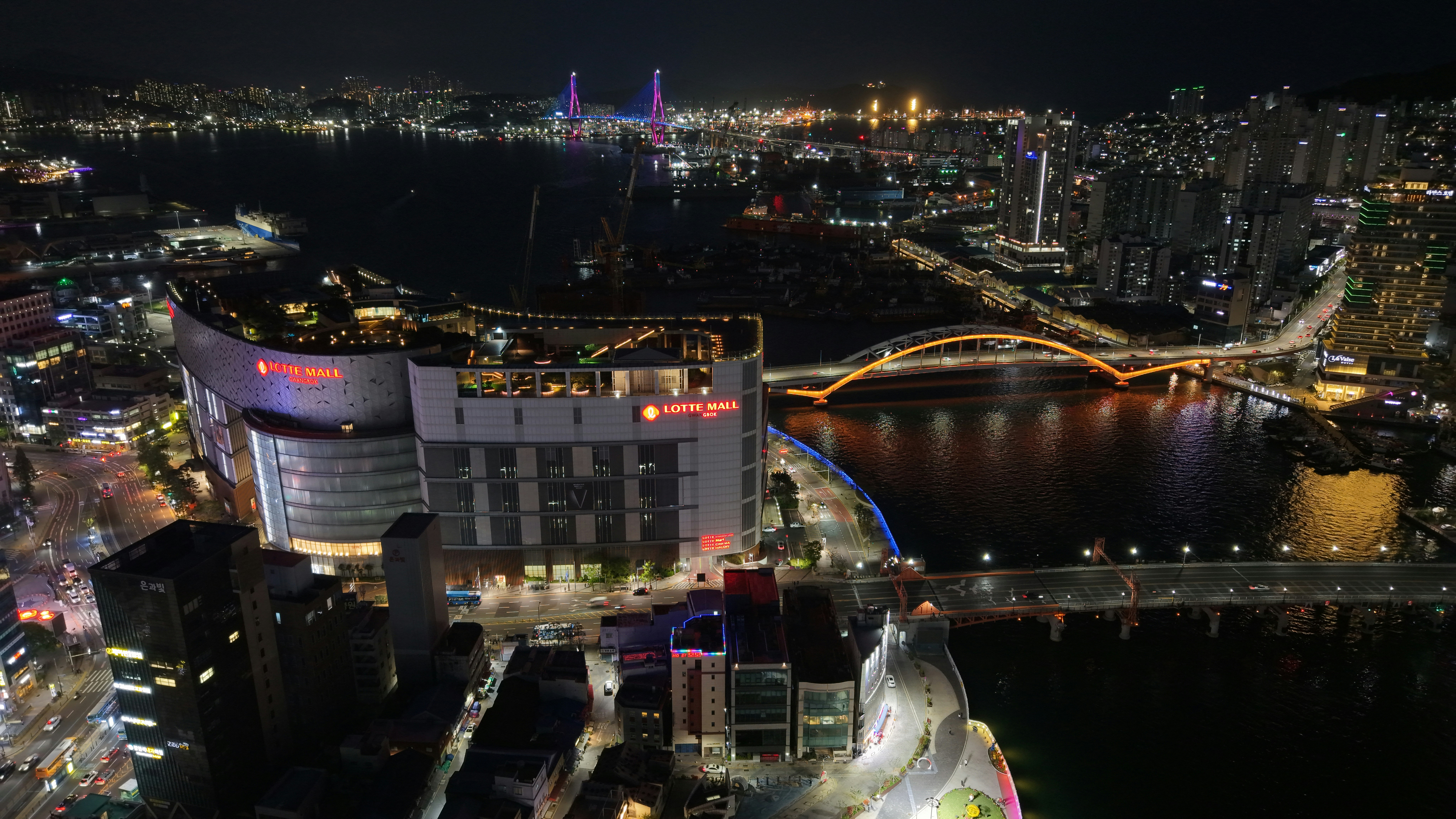 Neon Harbor Overlook: A Nighttime Cityscape from Above
