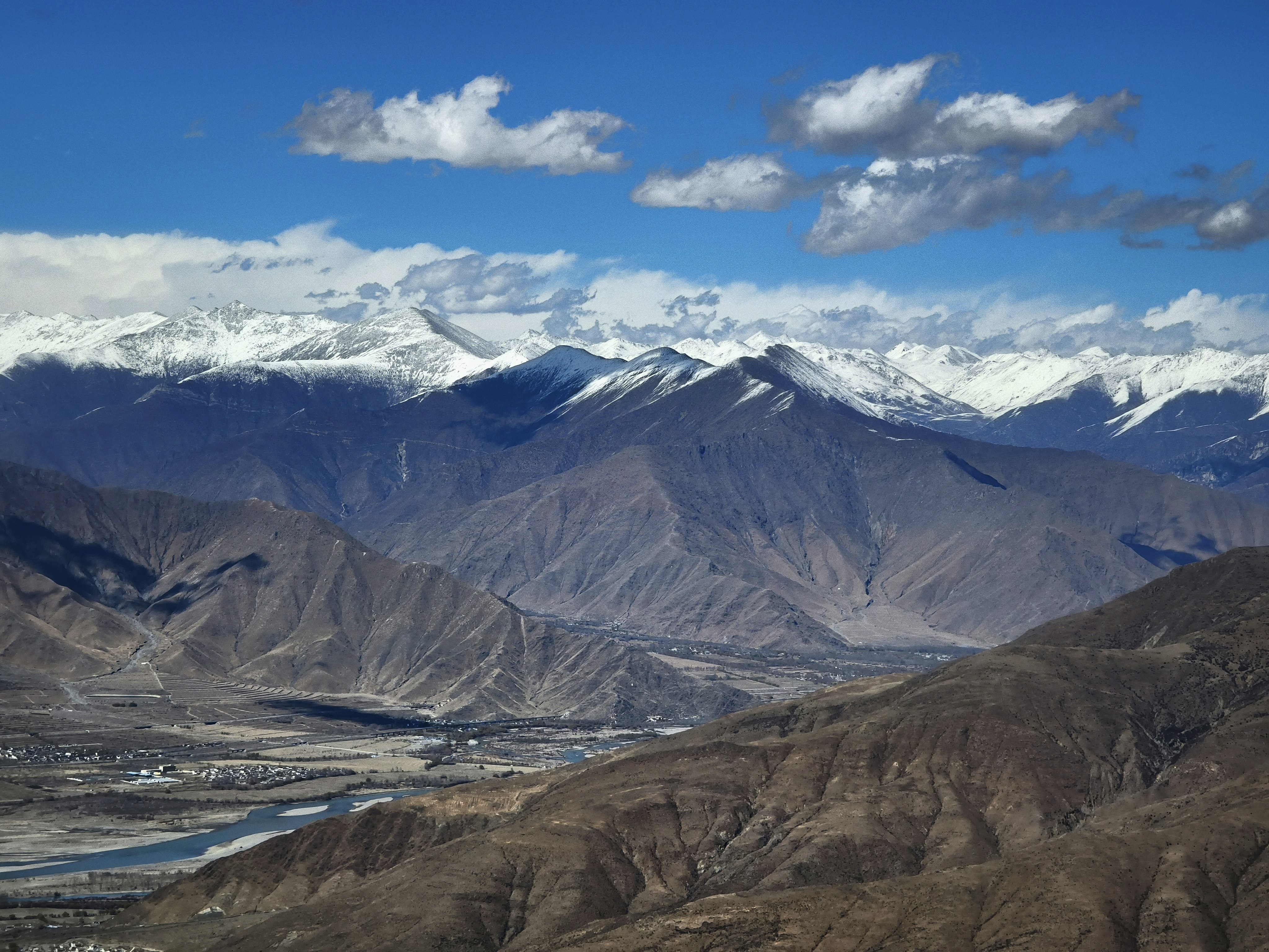 Snowbound Range Beneath a Blue Noon