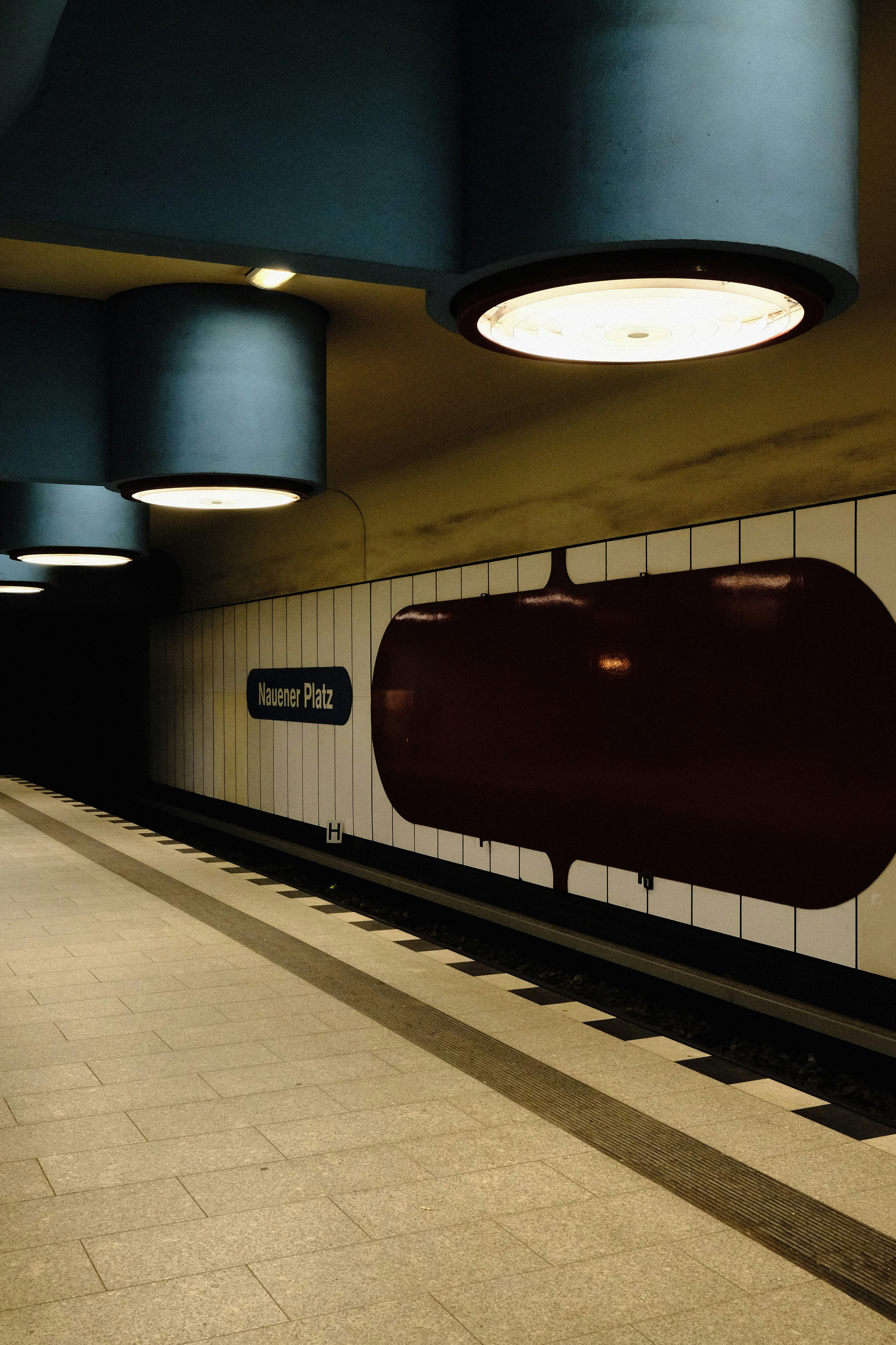 Subway Quiet: Neon Domes and Empty Platform