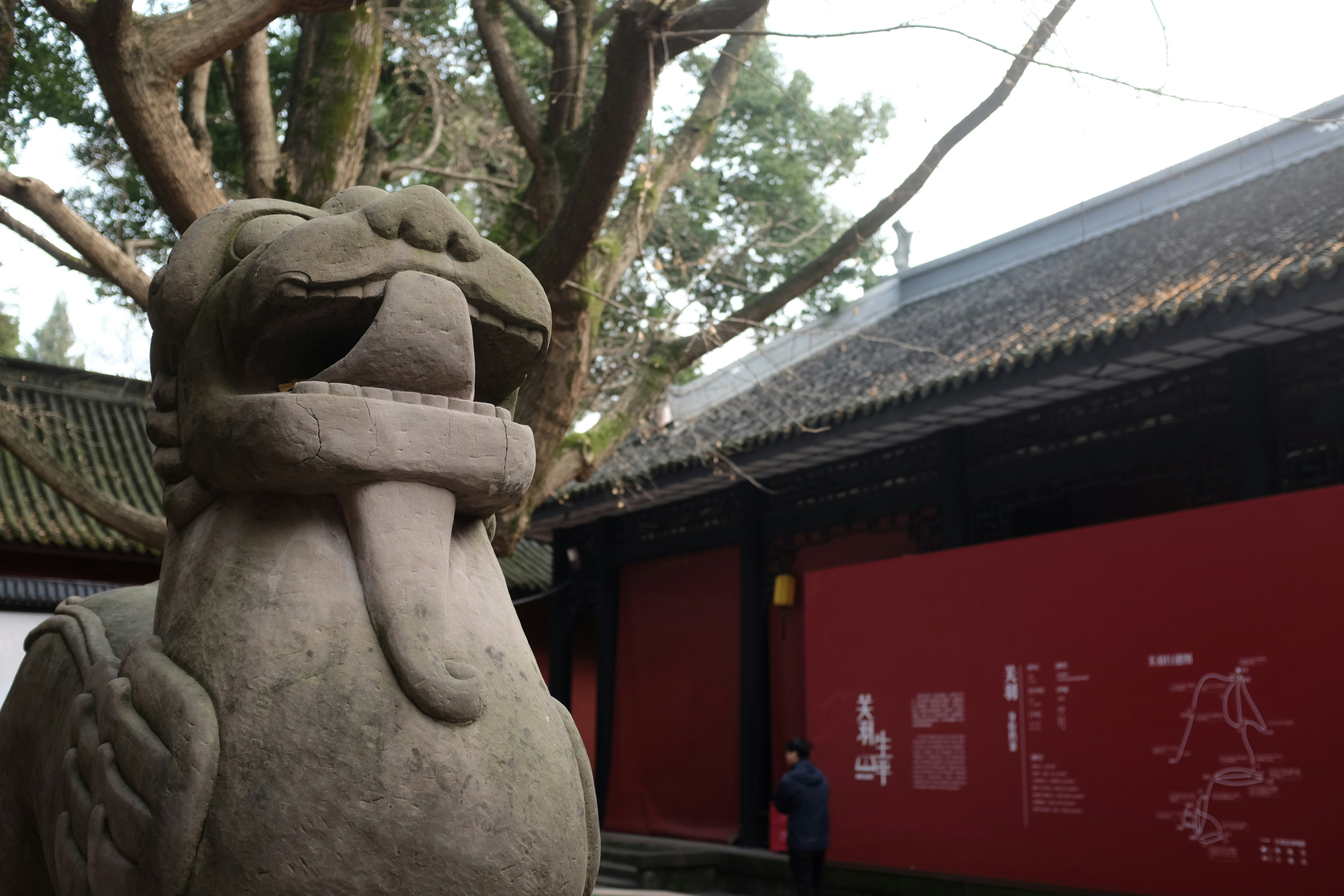 Stone guardian in a quiet temple courtyard