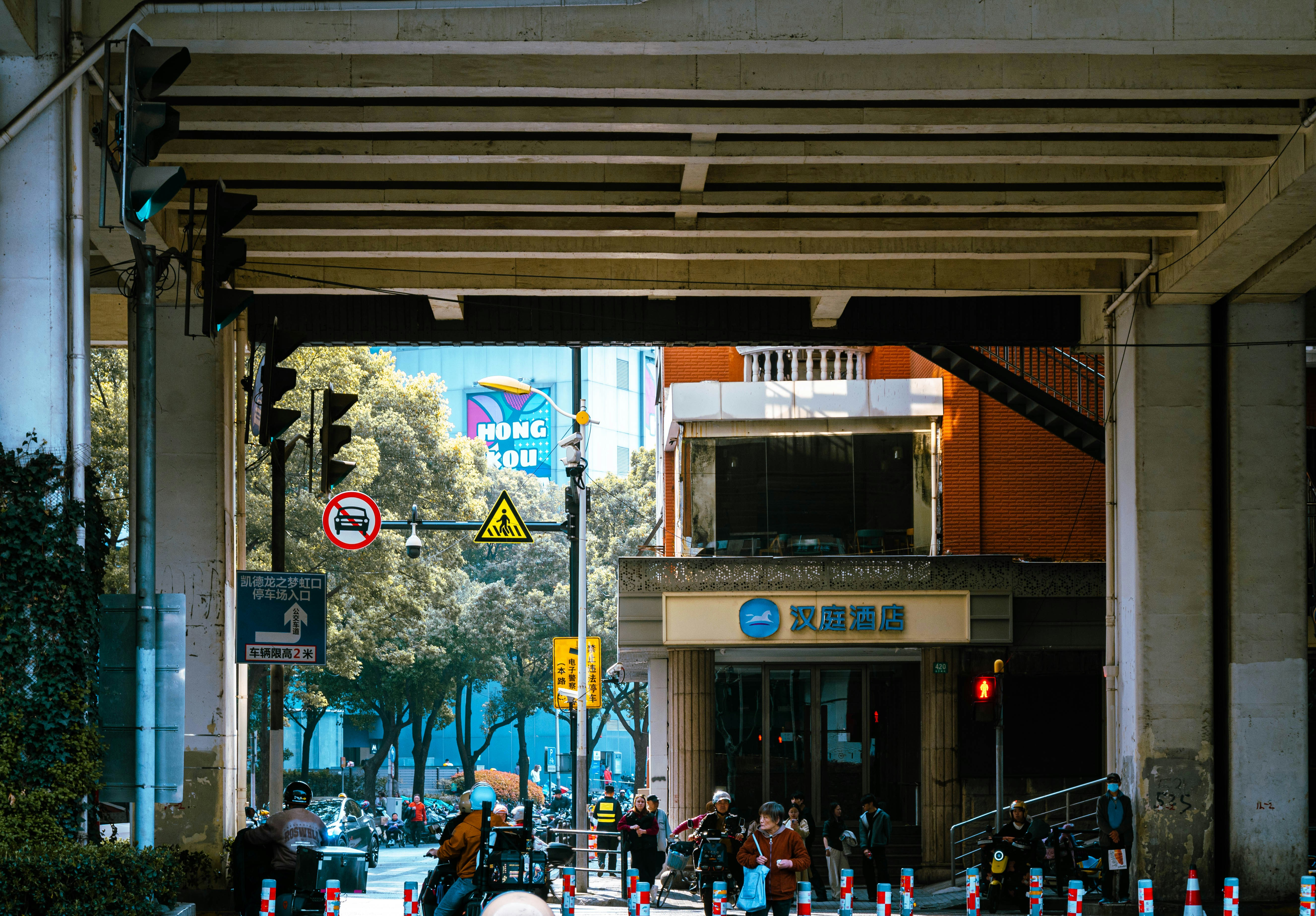 Urban Corridor Under the Overpass: A Quiet Street Scene