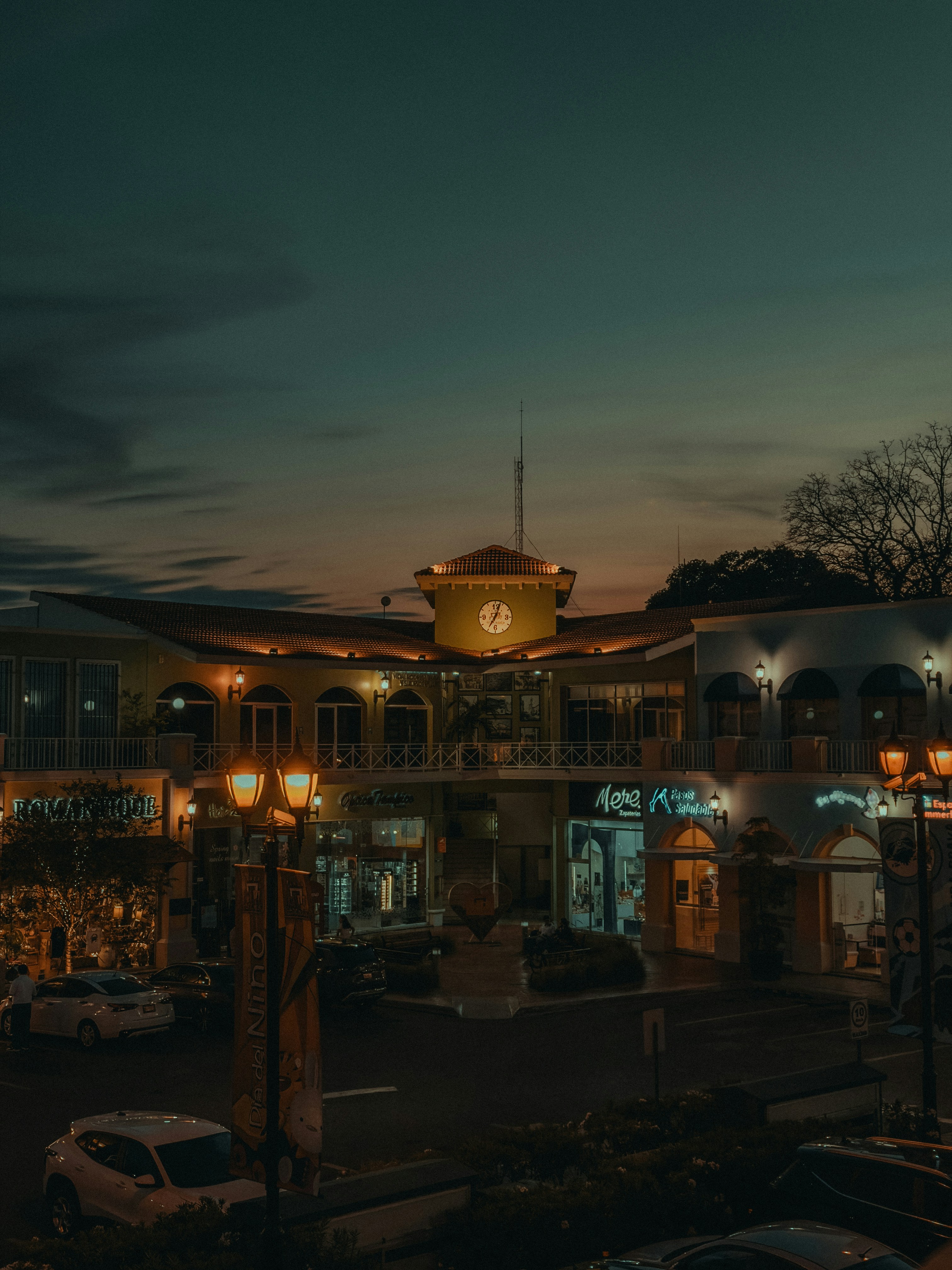Evening Clocktower in a Lively Plaza