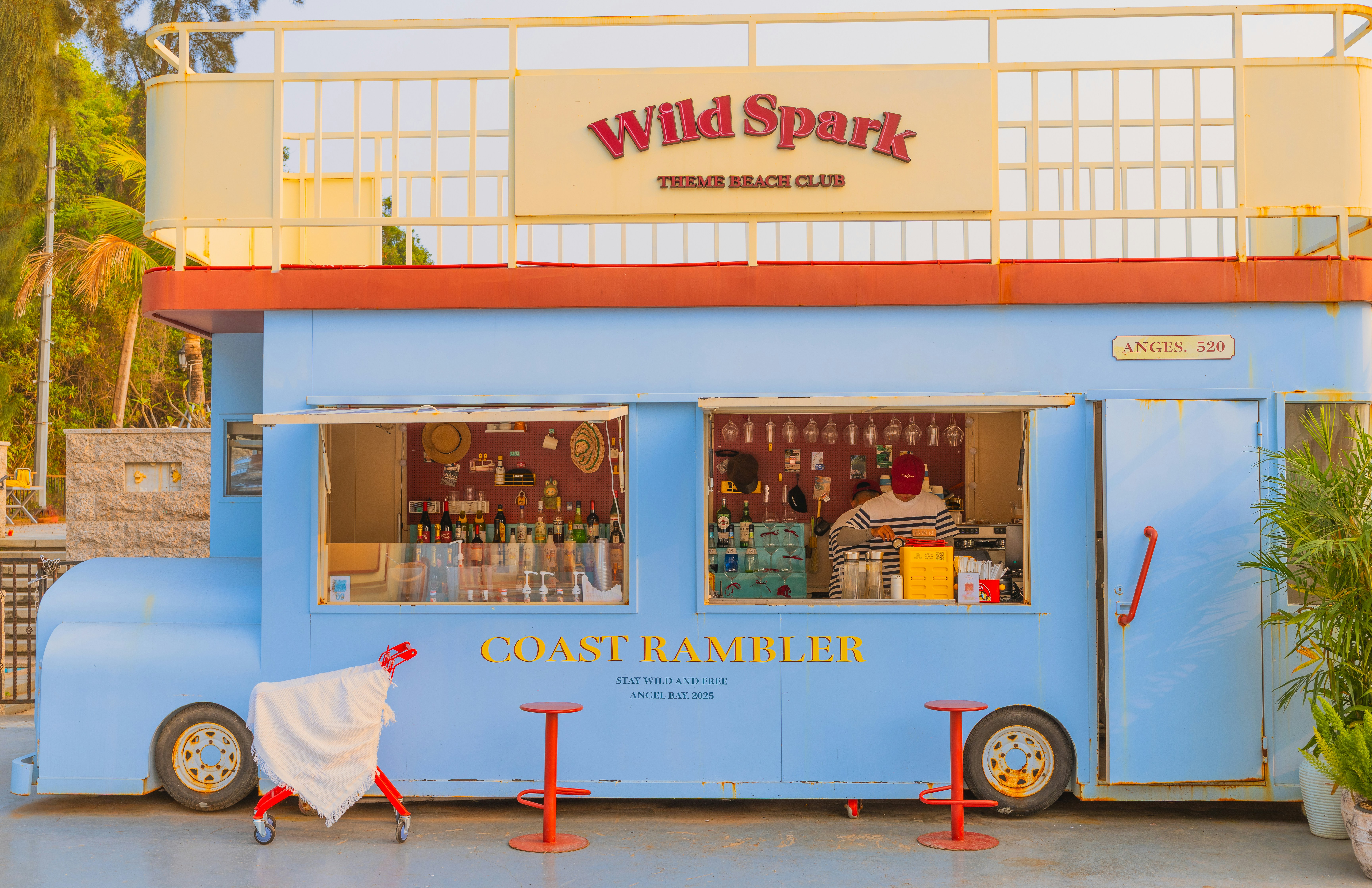Coast Rambler: Blue Food Truck at Sunset Oasis