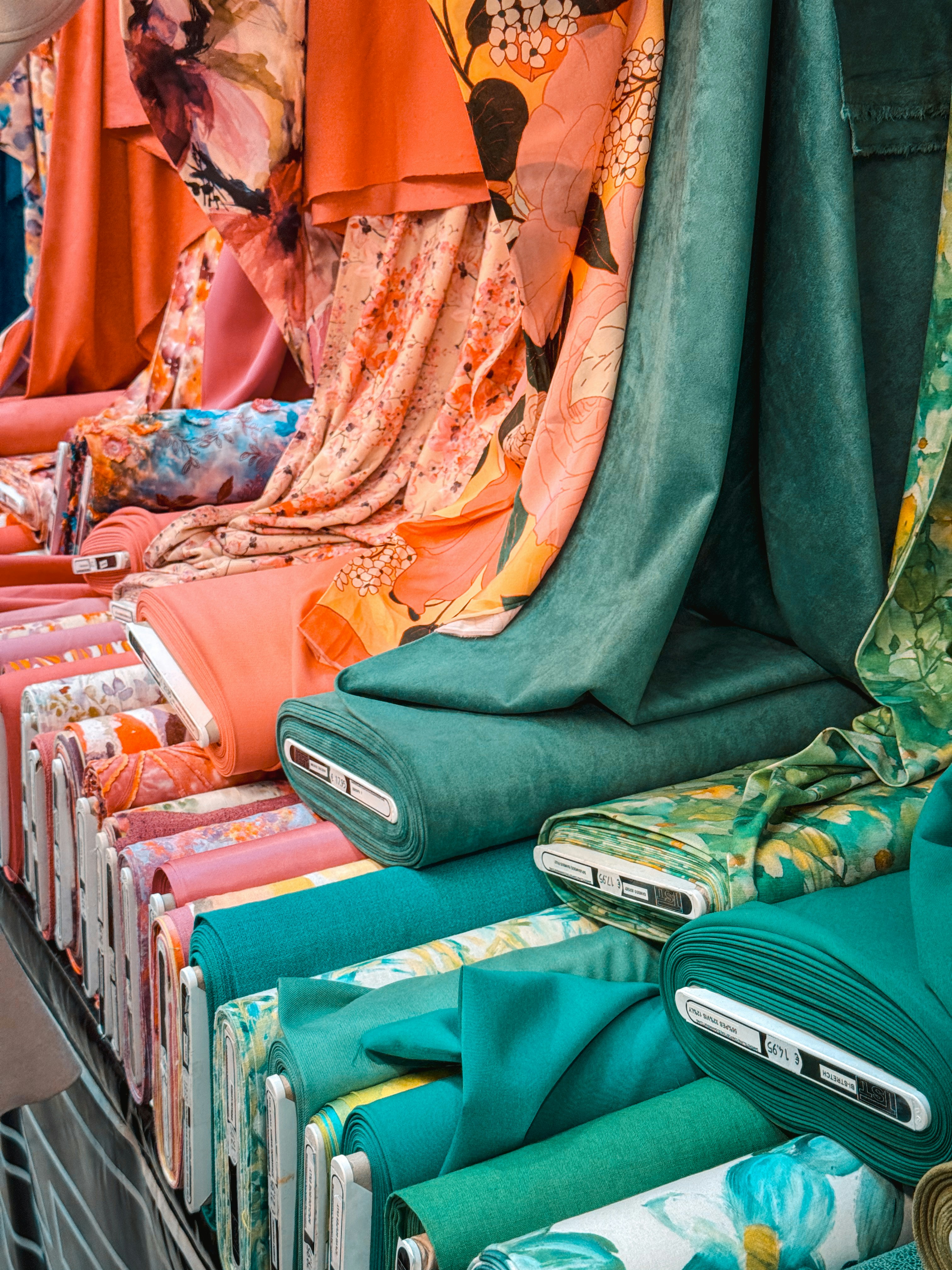 Colorful Cloth Cascade: Rolls of Fabric in a Textile Store
