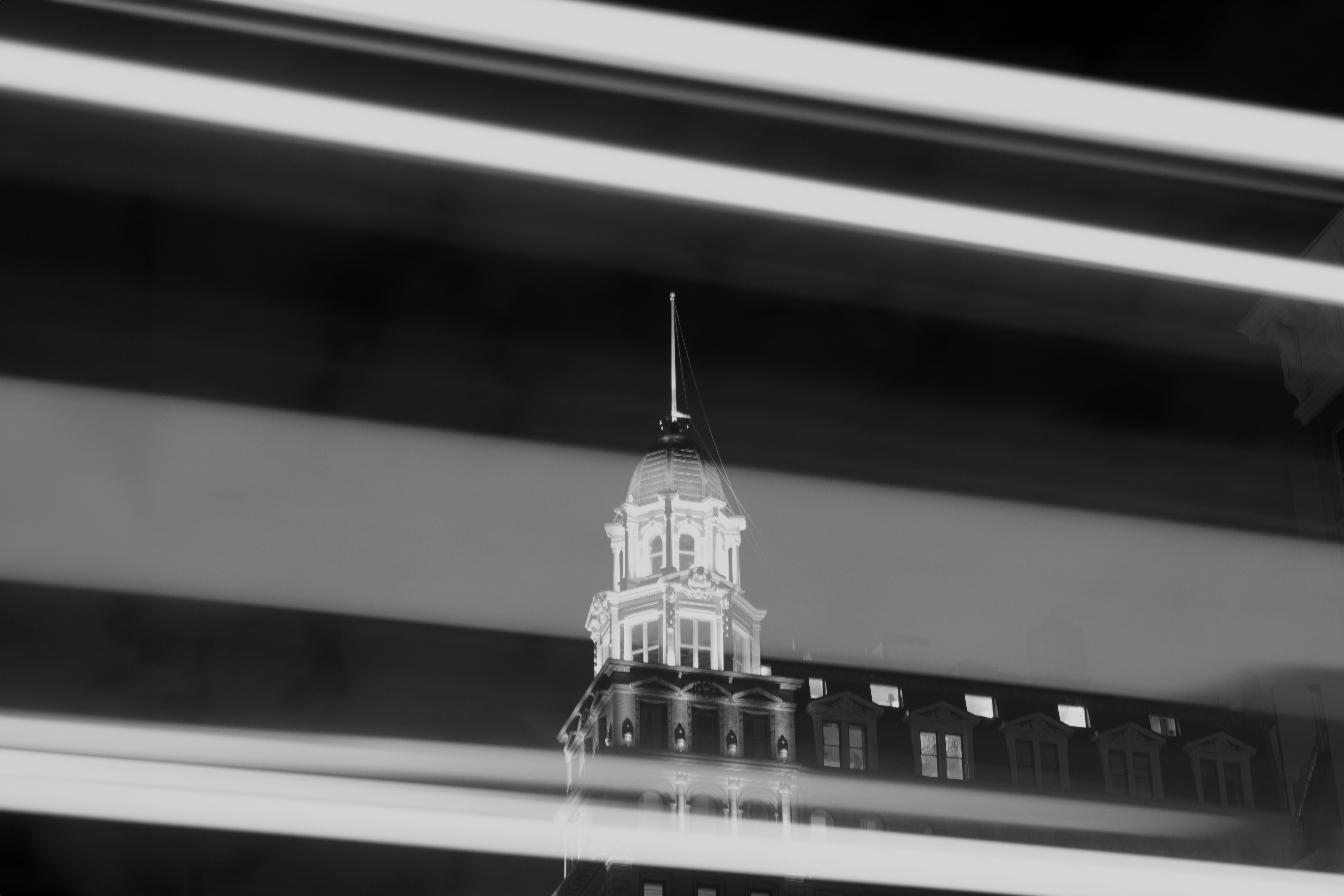 Clocktower Peak Through Light Streaks