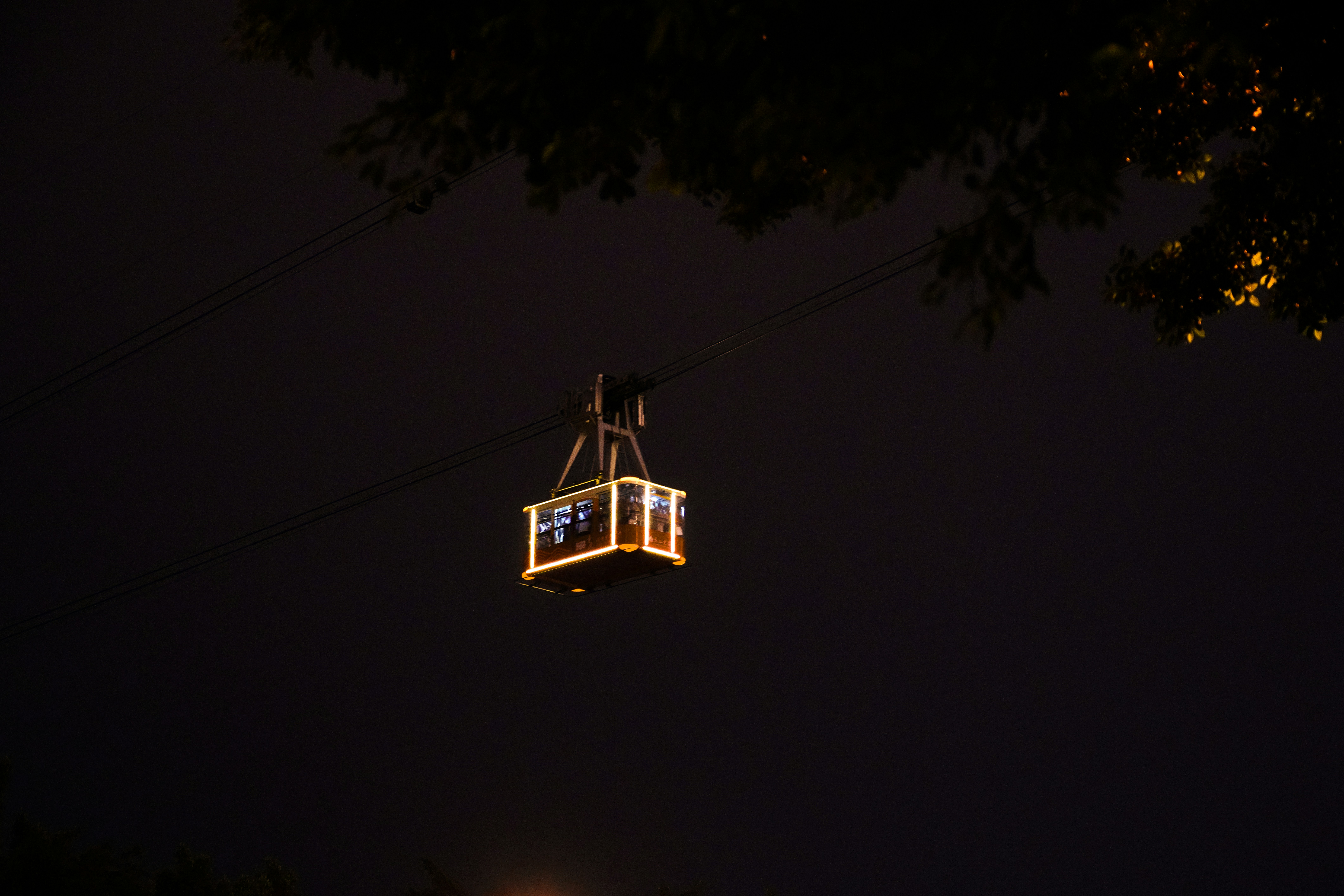 Midnight Cable Car: A Glimmering Ride Through the Dark