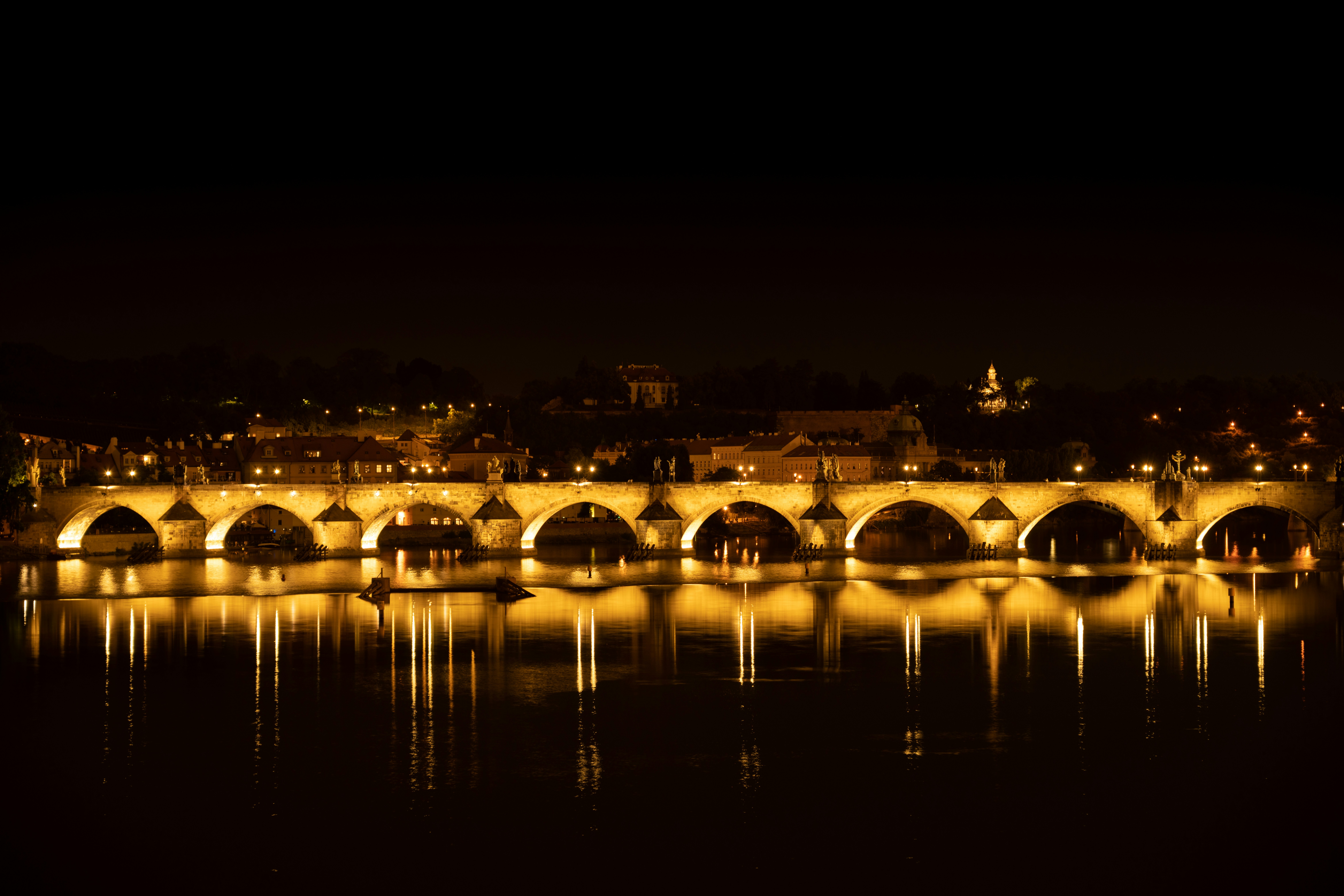 Golden Arches: Nighttime Arcades over the River