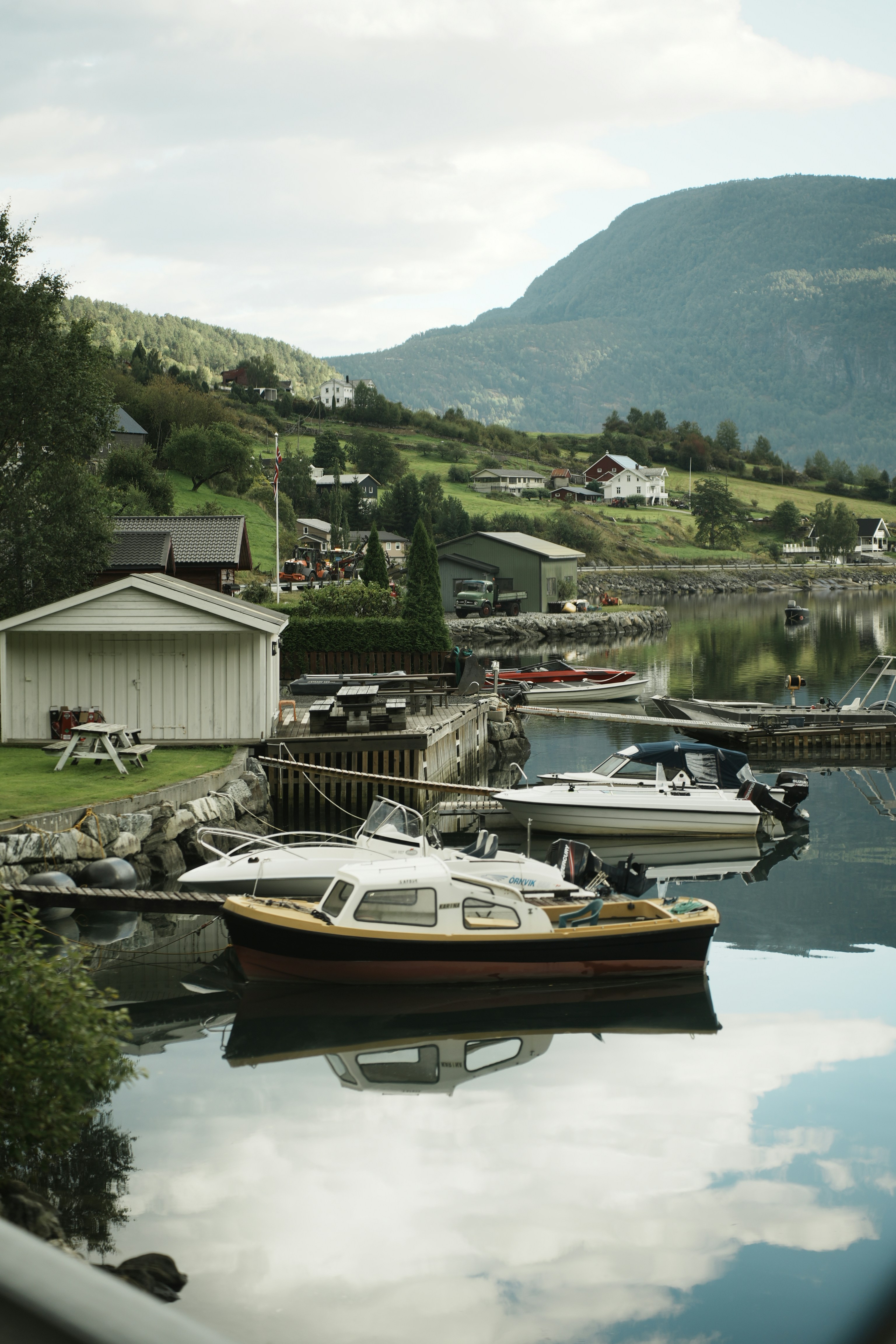 Boats Resting in a Serene Norwegianfjord Village