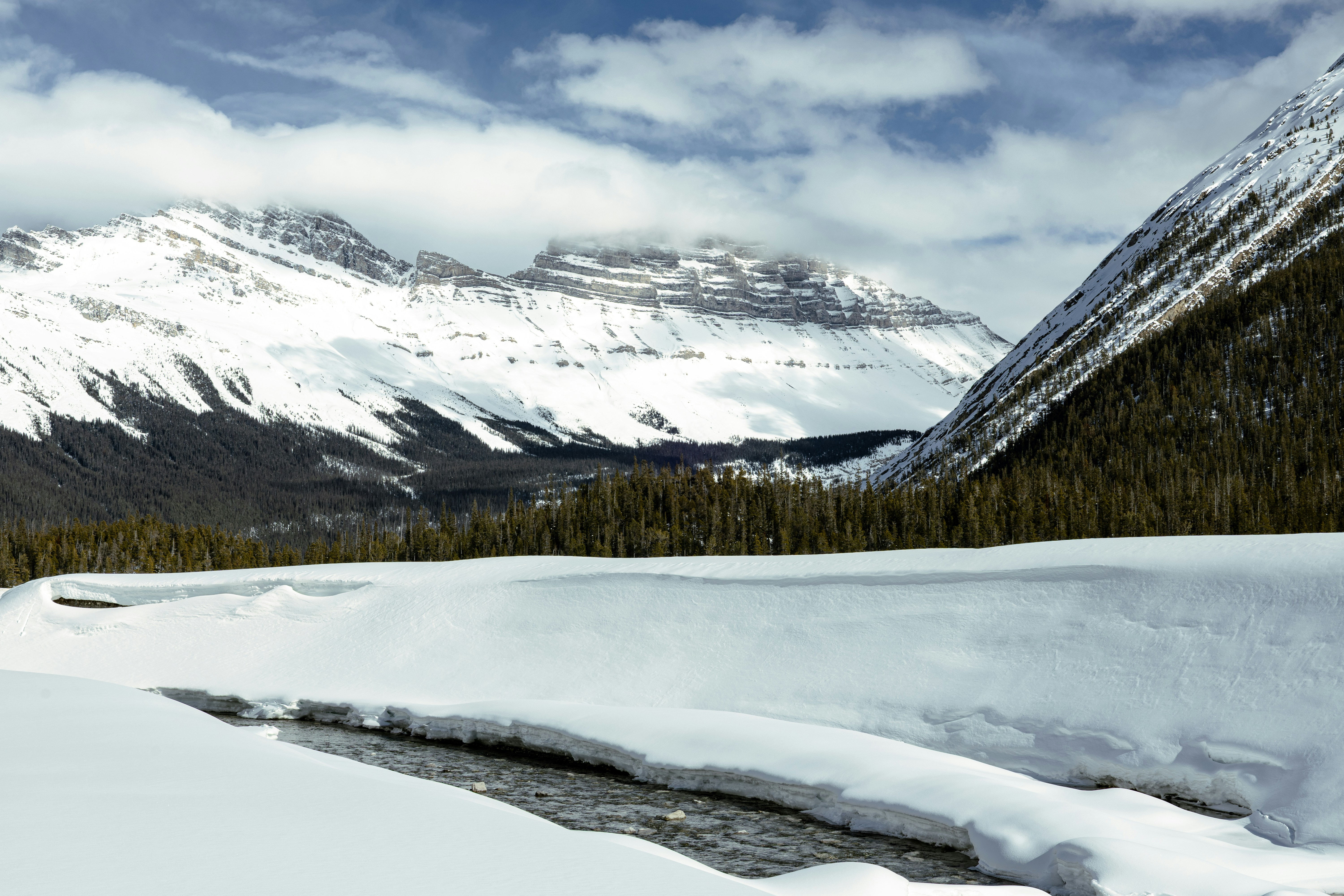 Snowbound Valley Under A Curved Sky