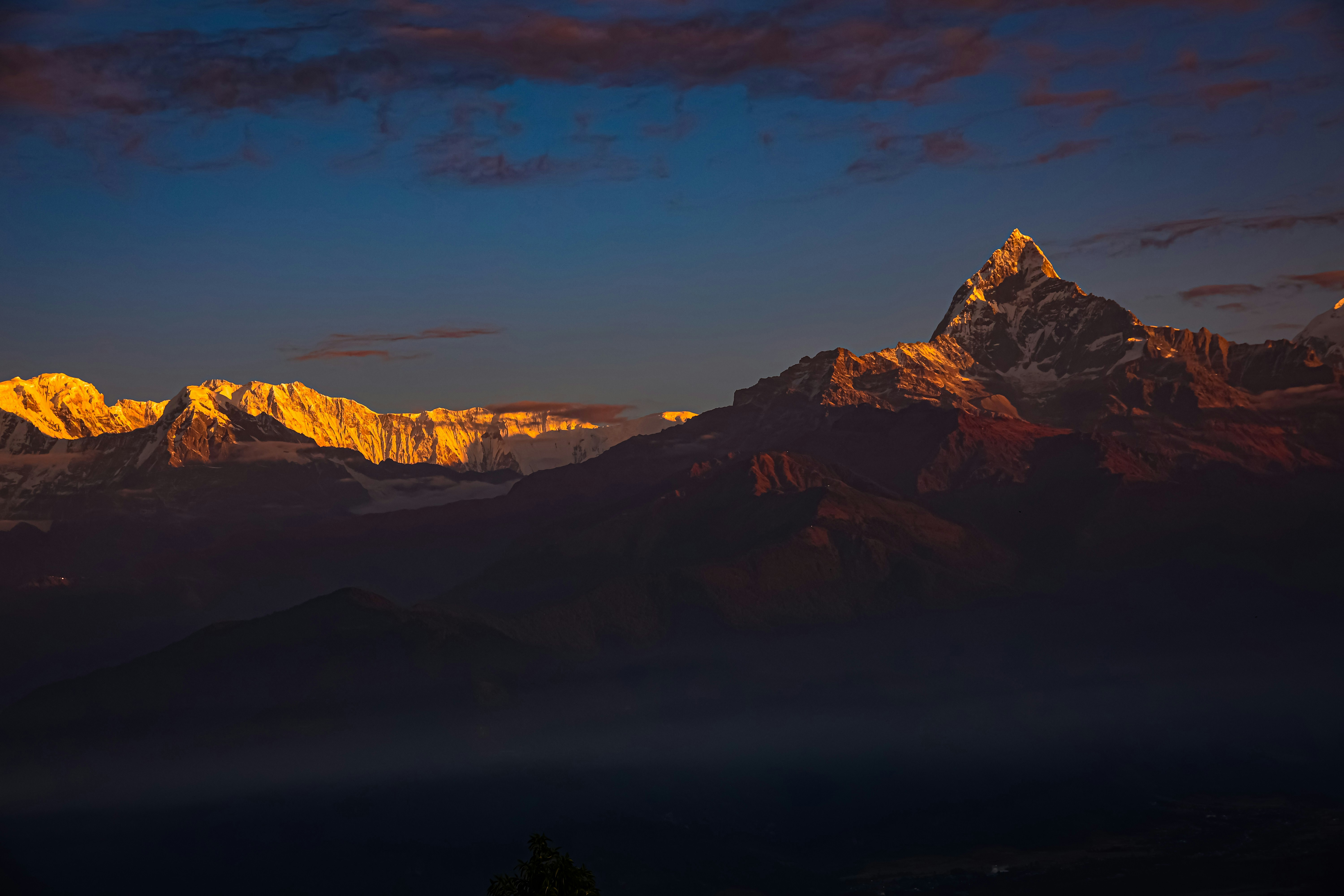 Golden Summit: The Peak Illuminated at Dusk