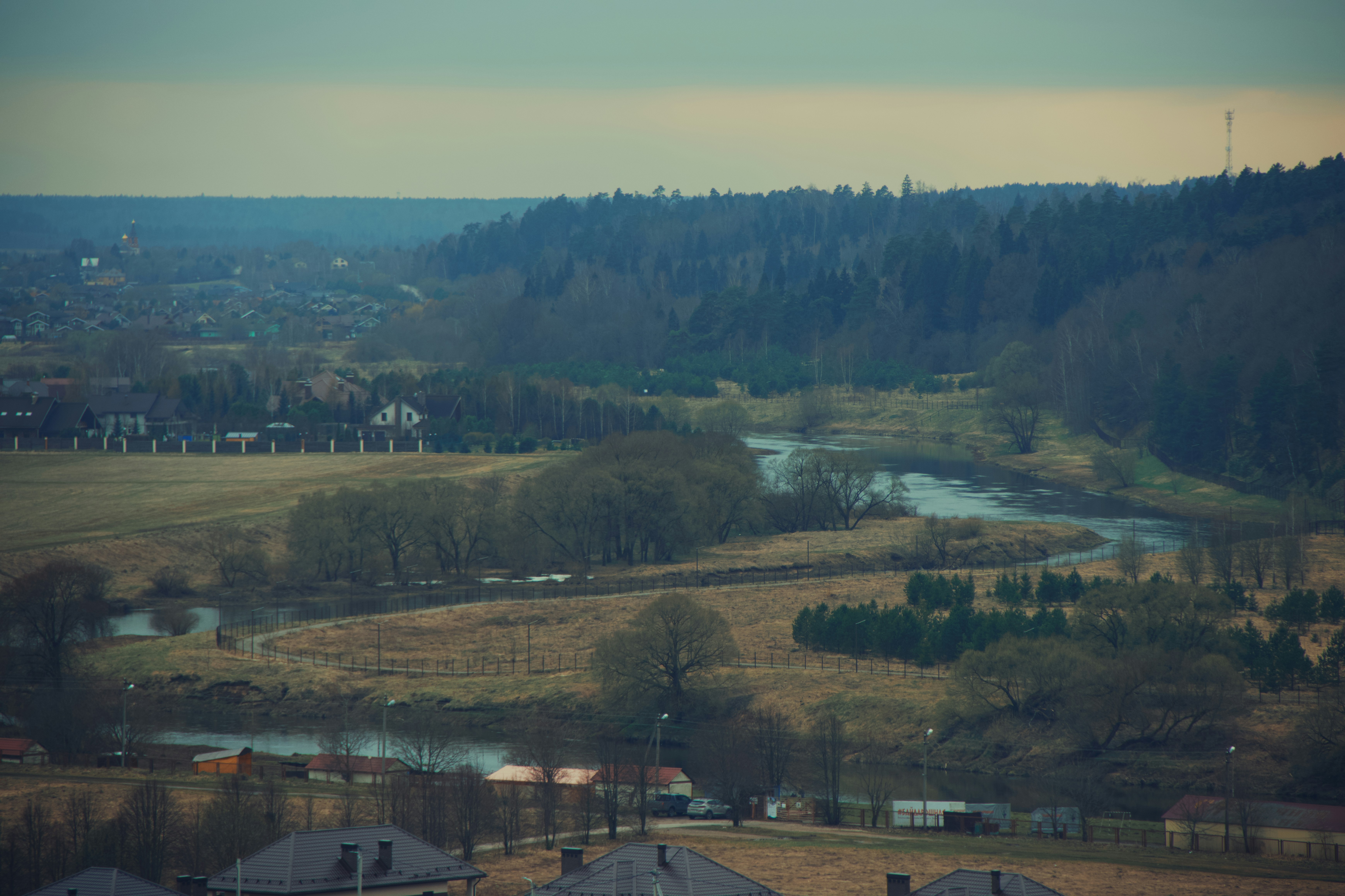 Polished River Bend Over rolling fields