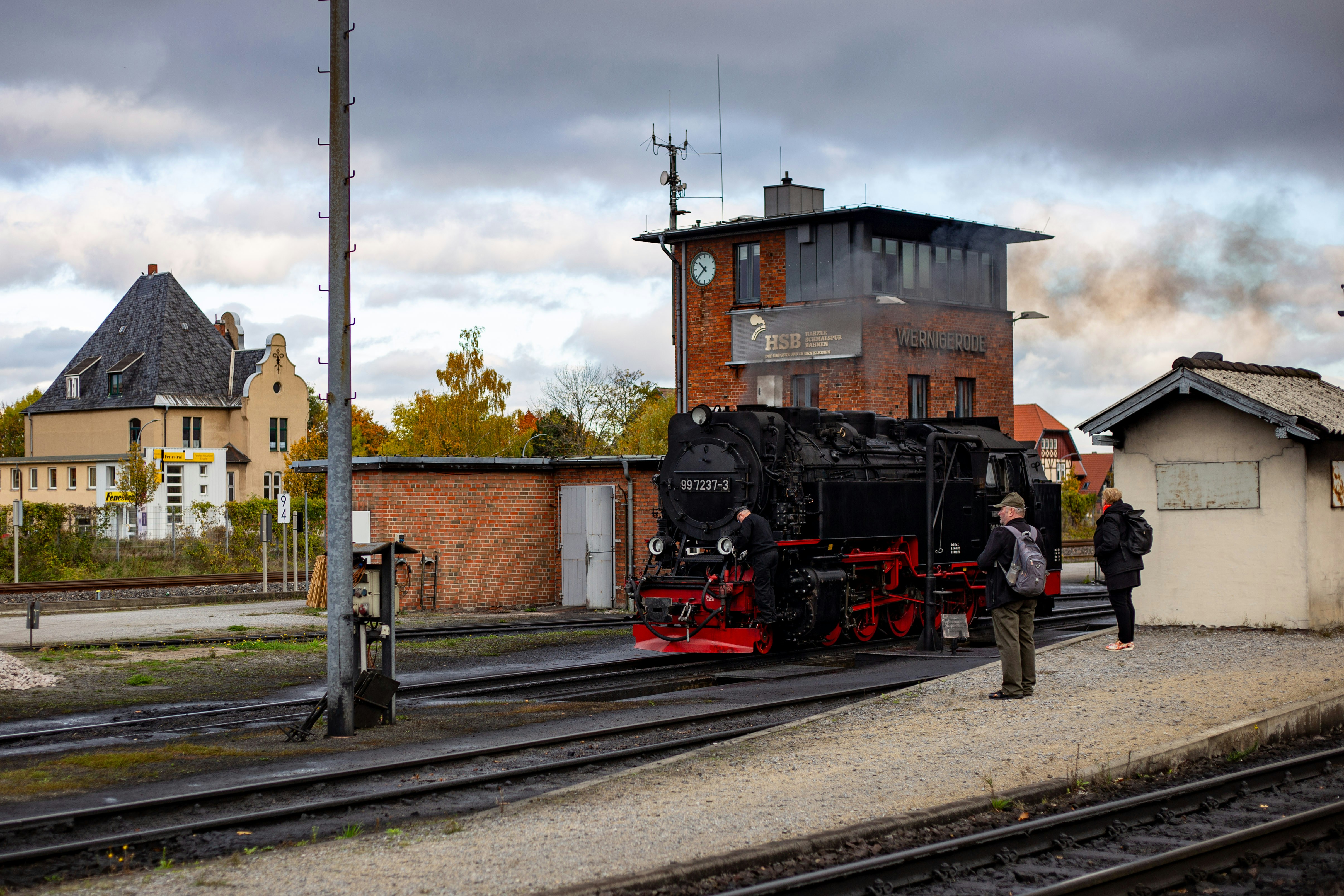 Steam on the Rails: A Restored Locomotive at a Quiet European Station