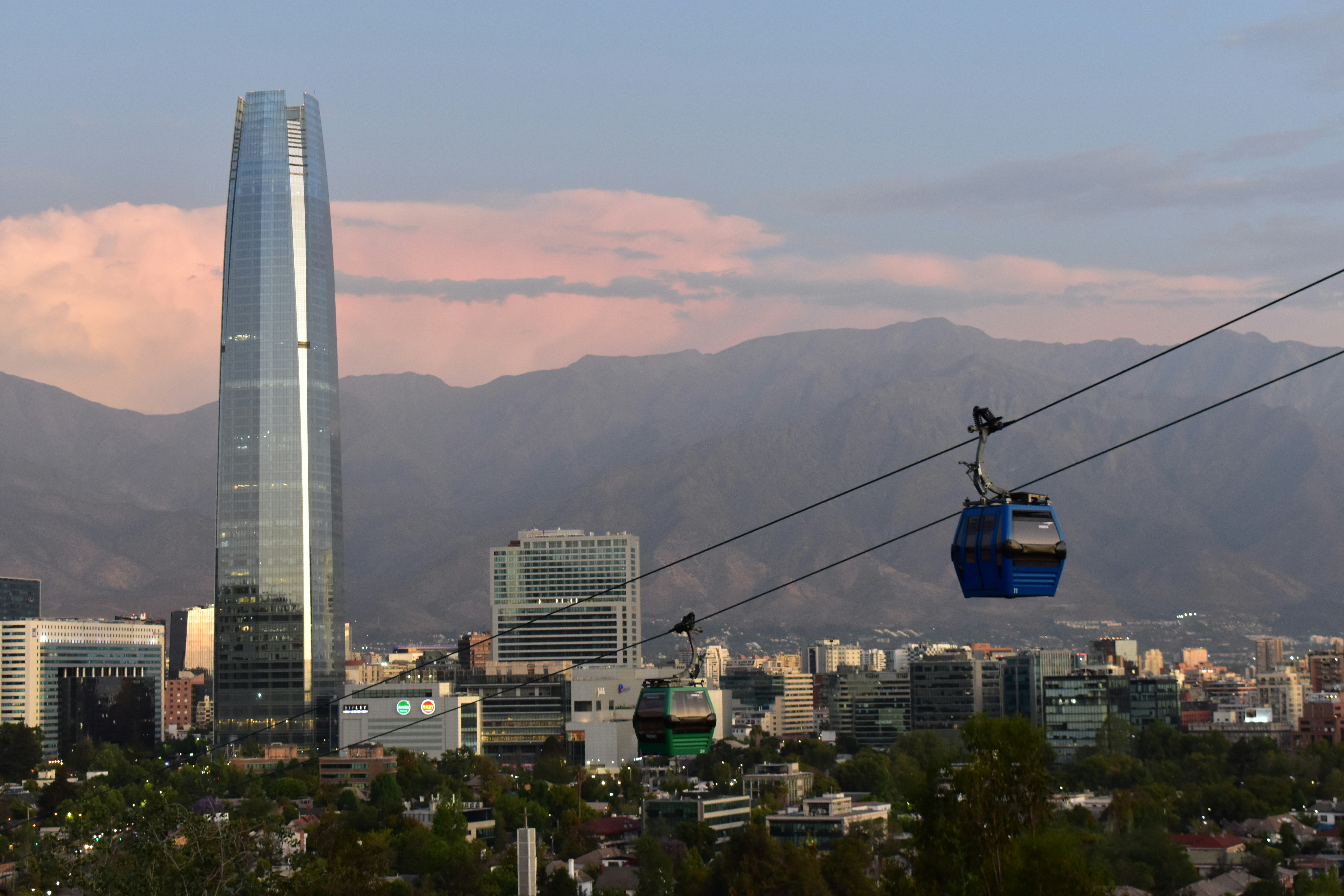 City Lift: Cable Cars Against a Mountain Sunset