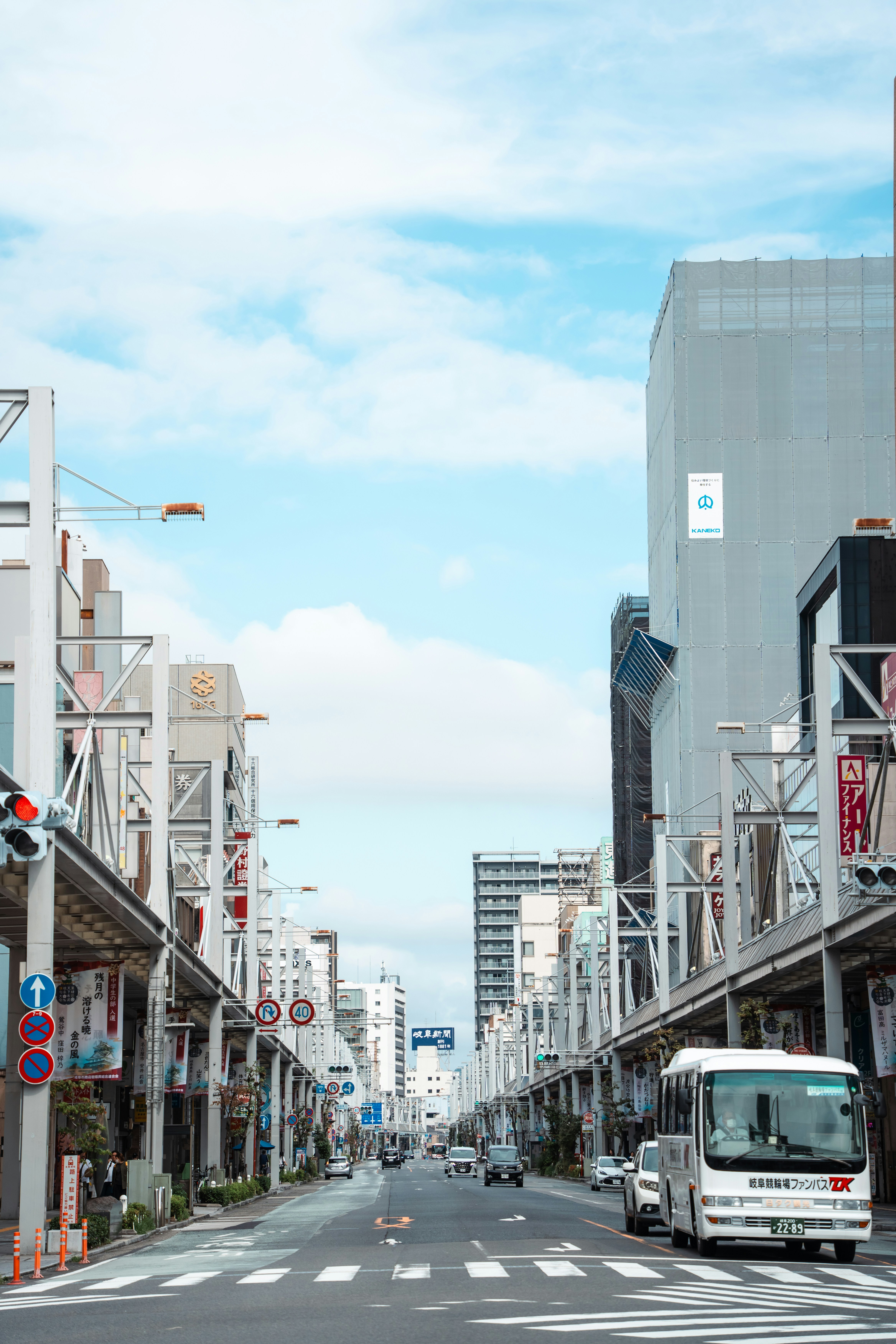 Urban Corridor: A Quiet Street Framed by Skyward Modernity
