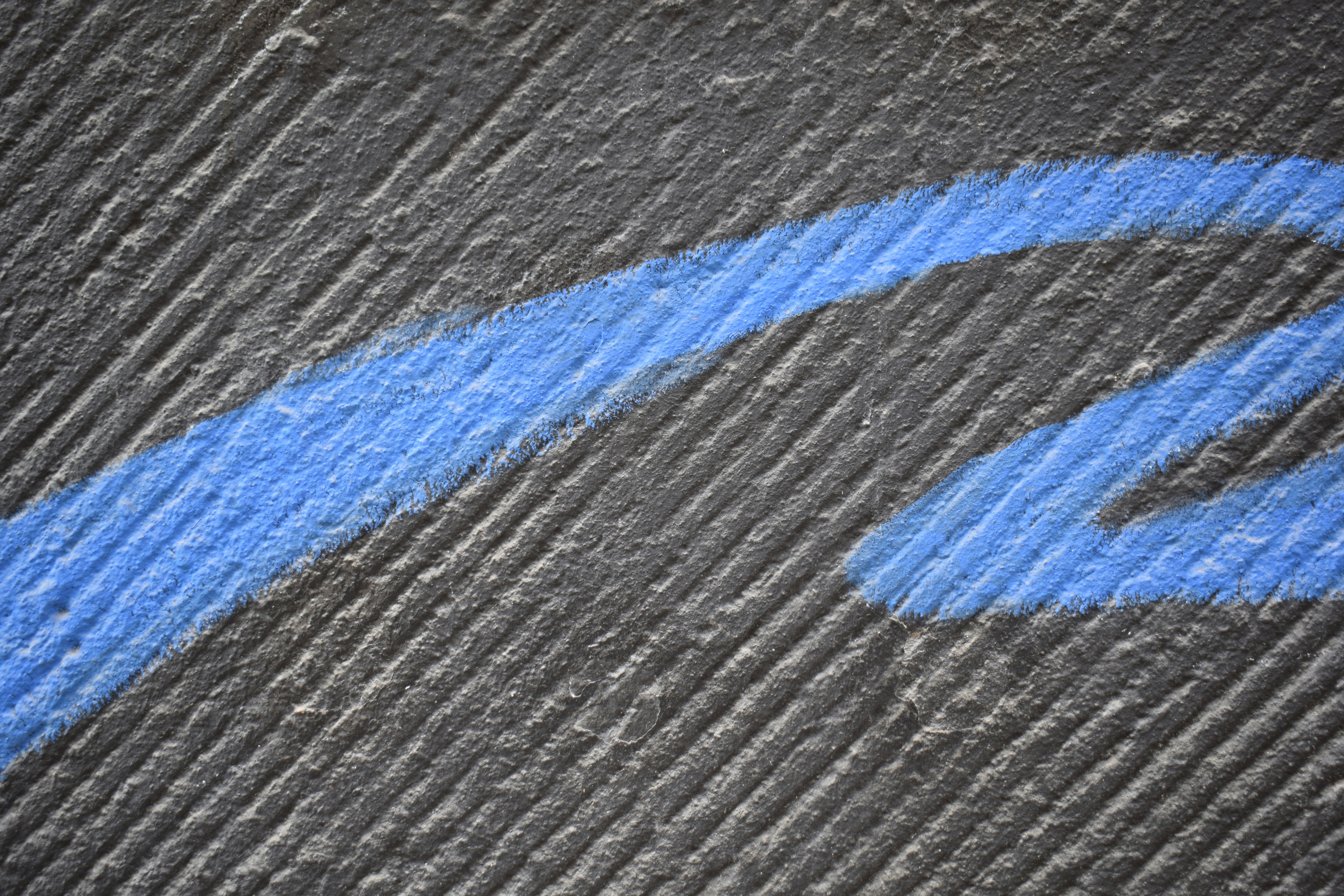Blue Arc on Weathered Wood
