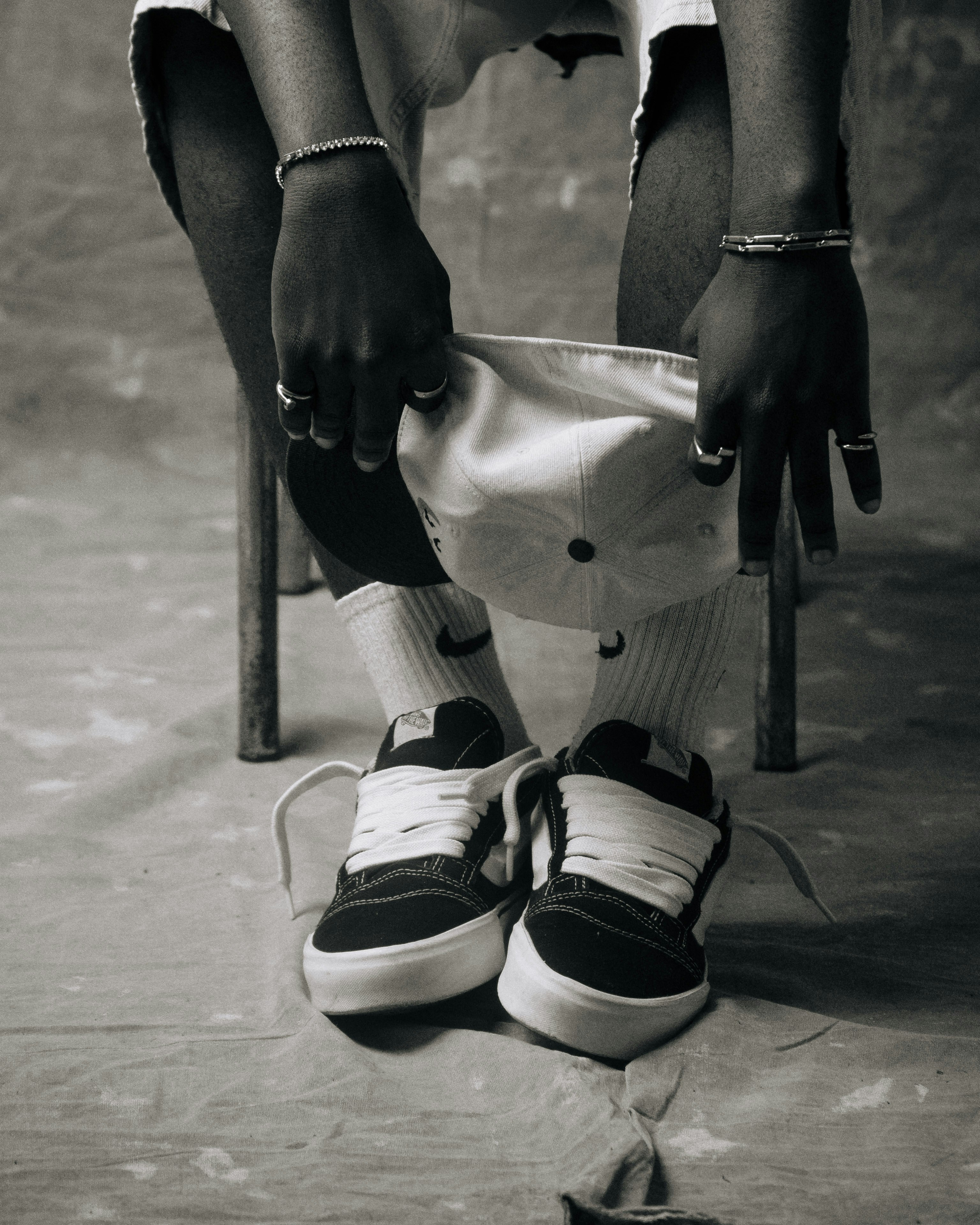 Laced Beginnings: Shoes and Hands at Ground Level