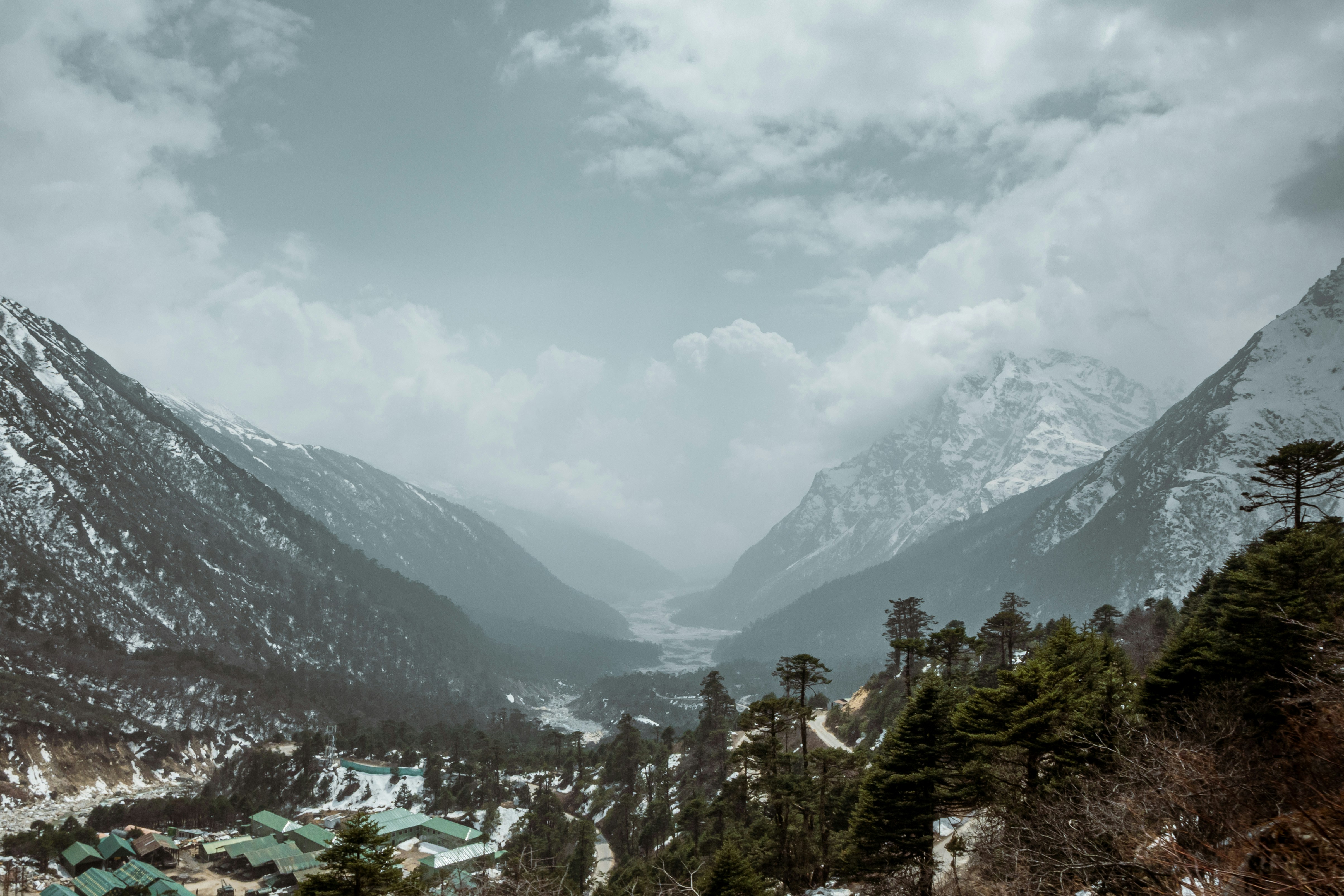 Valley Between Snow-Kissed Peaks