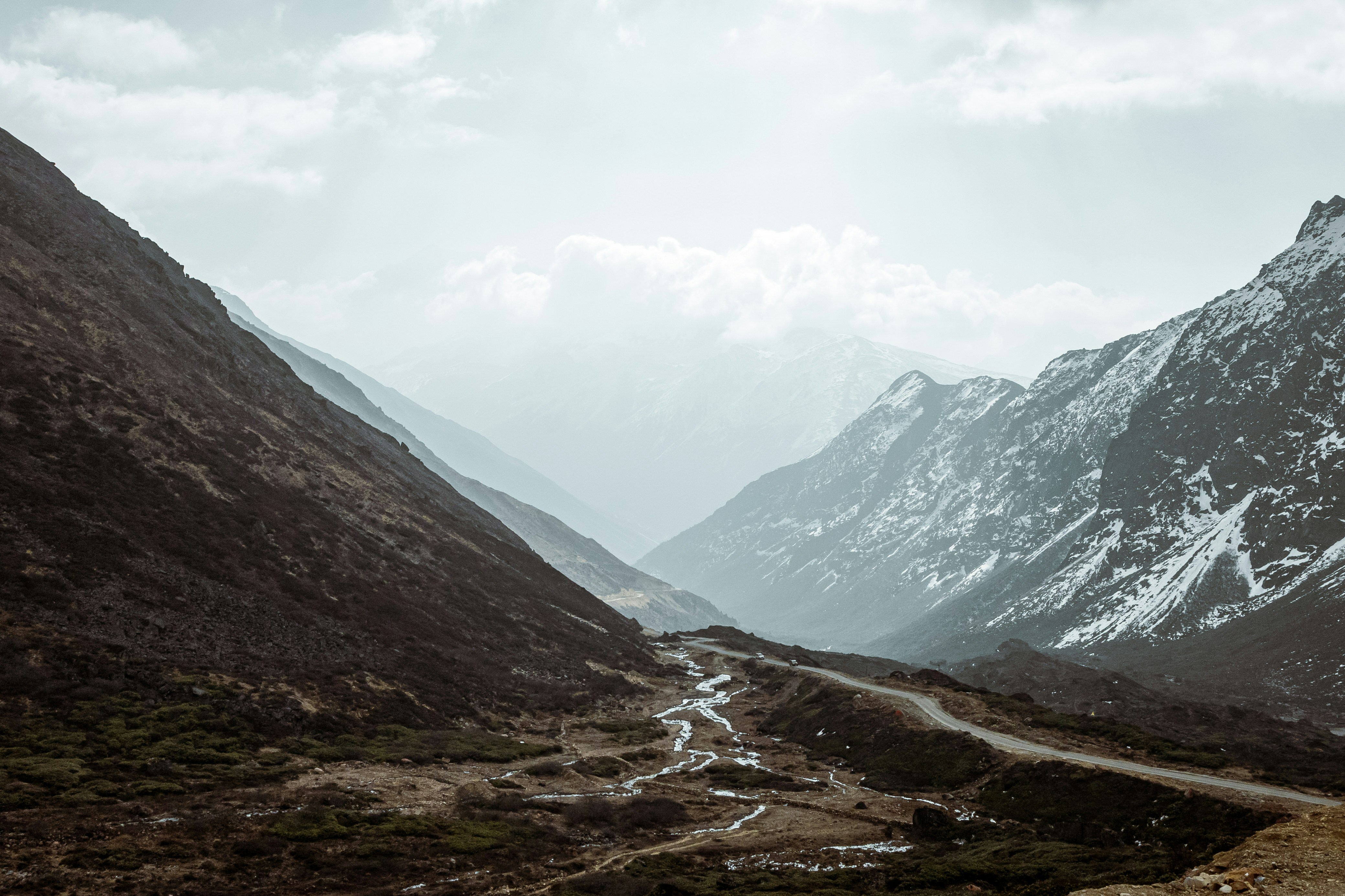 Valley of Echoes: A Snowlit Corridor Between Ridges