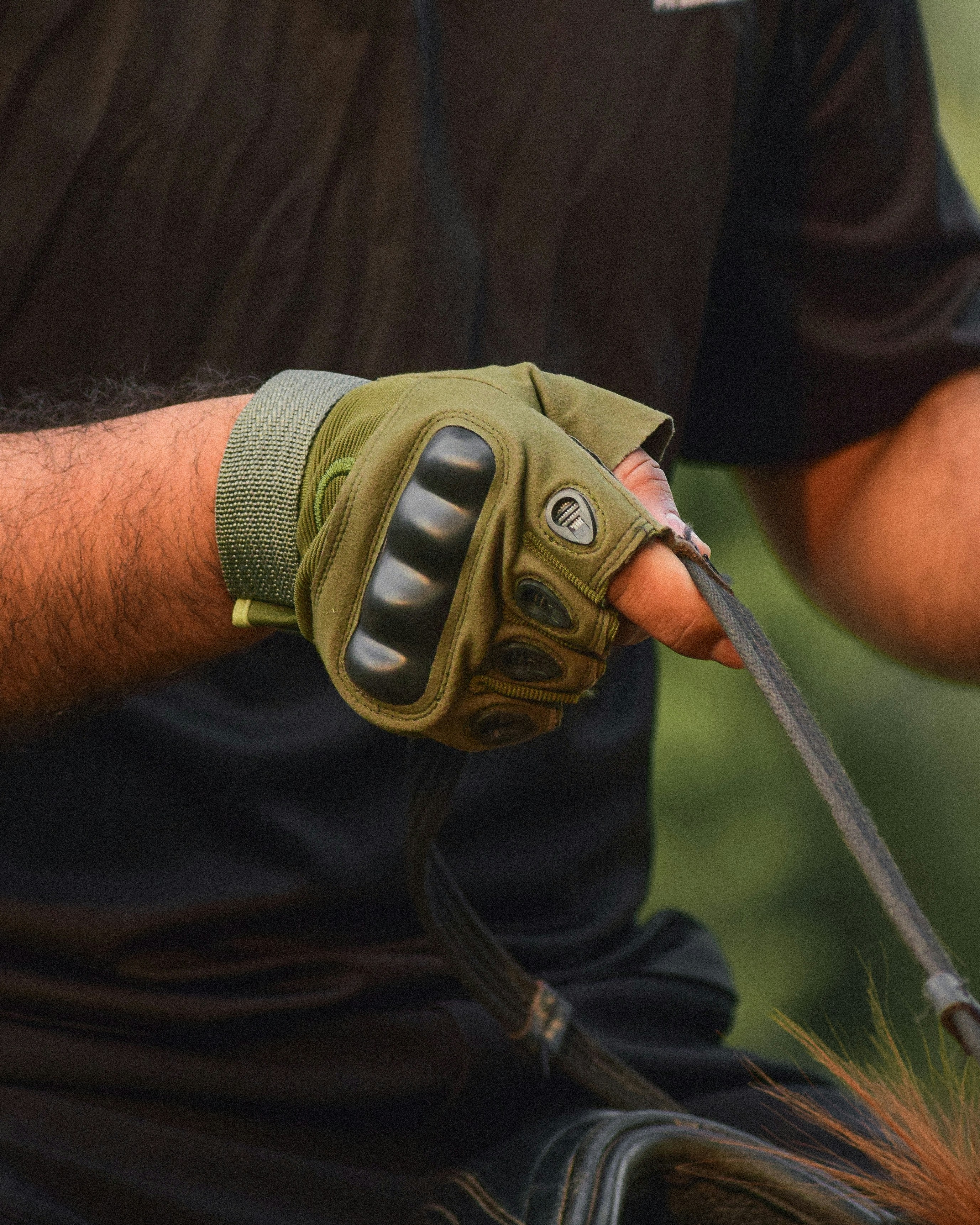 Grip and Tension: The Hand Shielded by Tactical Glove and Rope