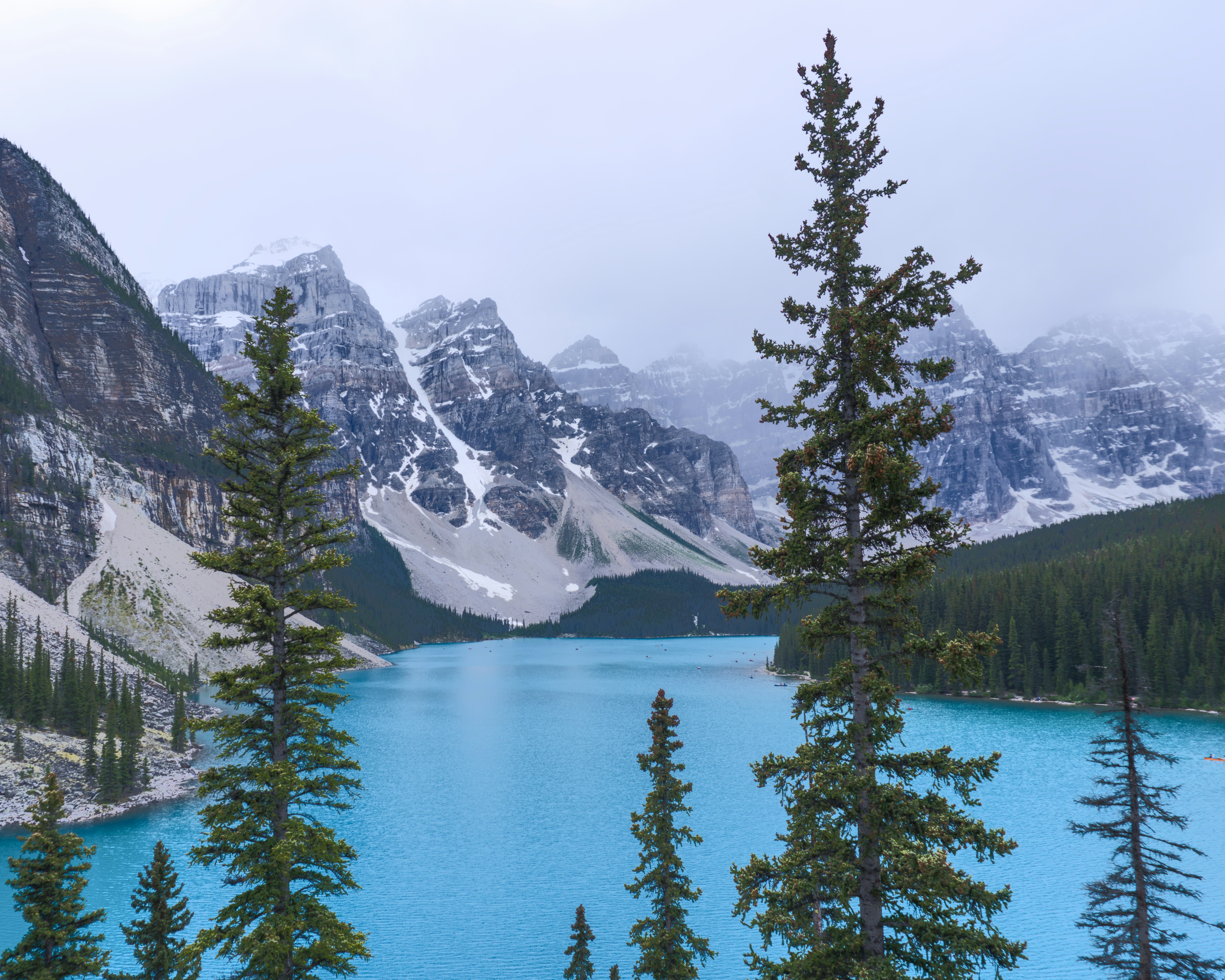 Emerald Mirror: Snow-Capped Peaks Framing a Turquoise Lake