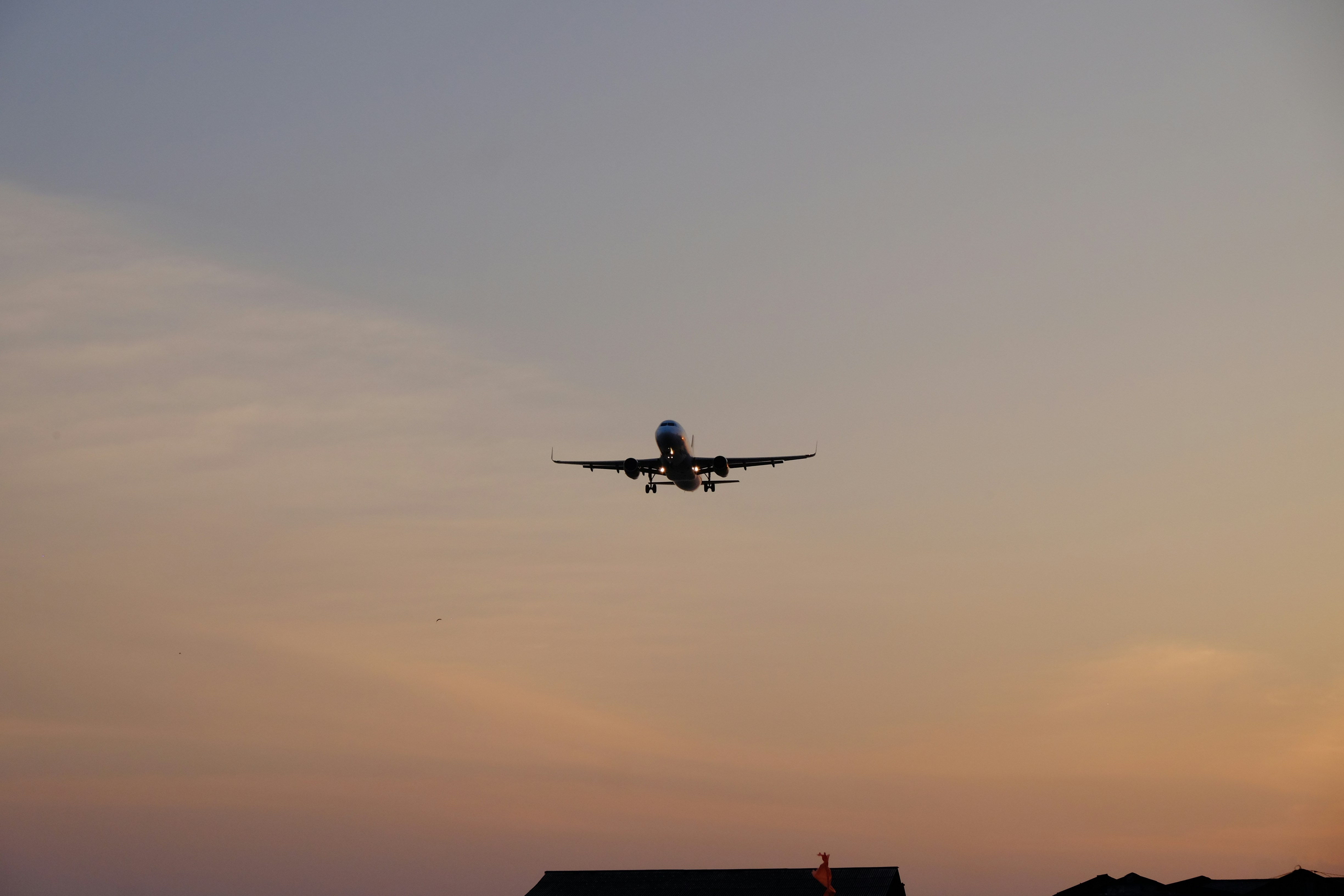 Midair Descent: A Solo Jet Falls into the Horizon