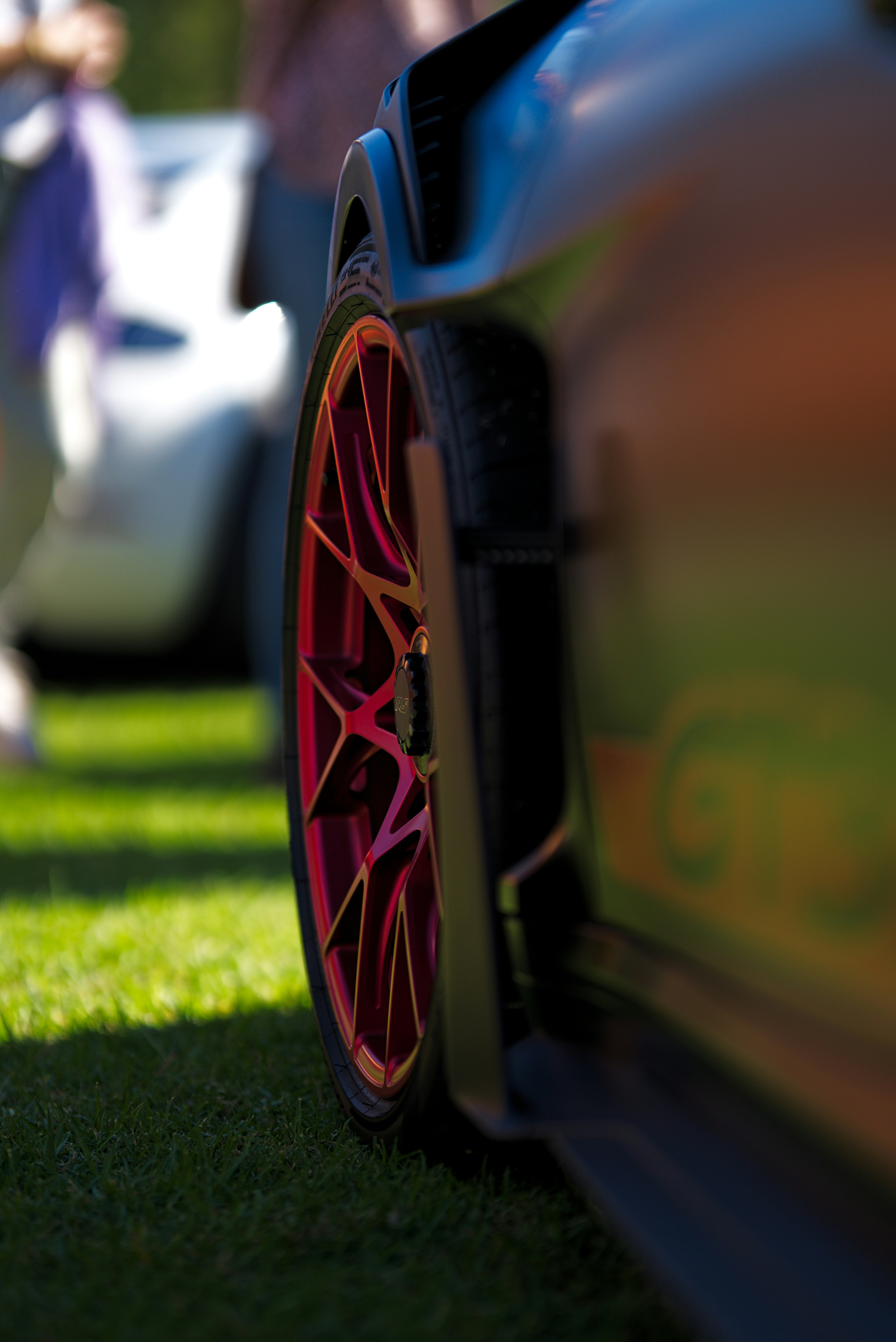 Vibrant Wheel, Quiet Car, Sharp Shadow