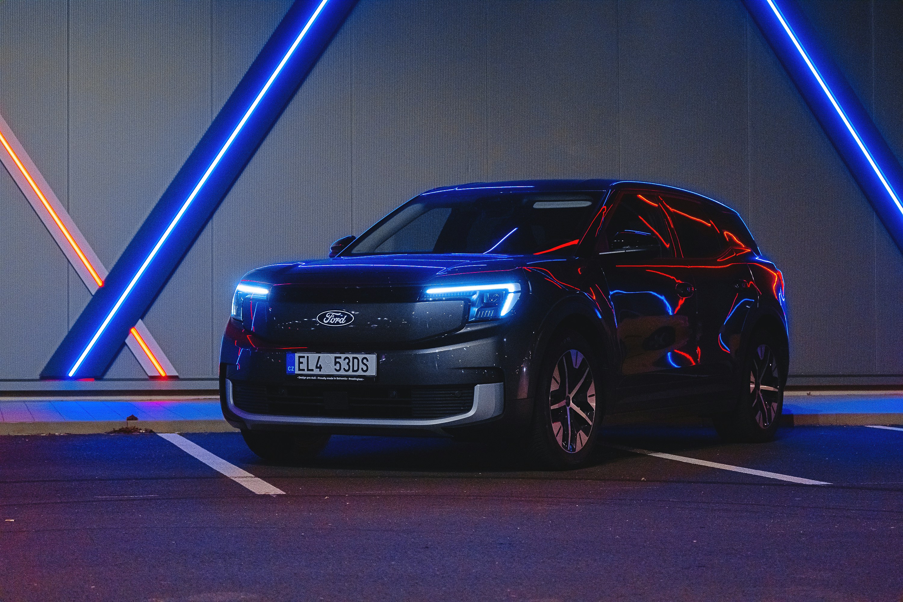 Neon-lit SUV Rendezvous in a Geometric Night