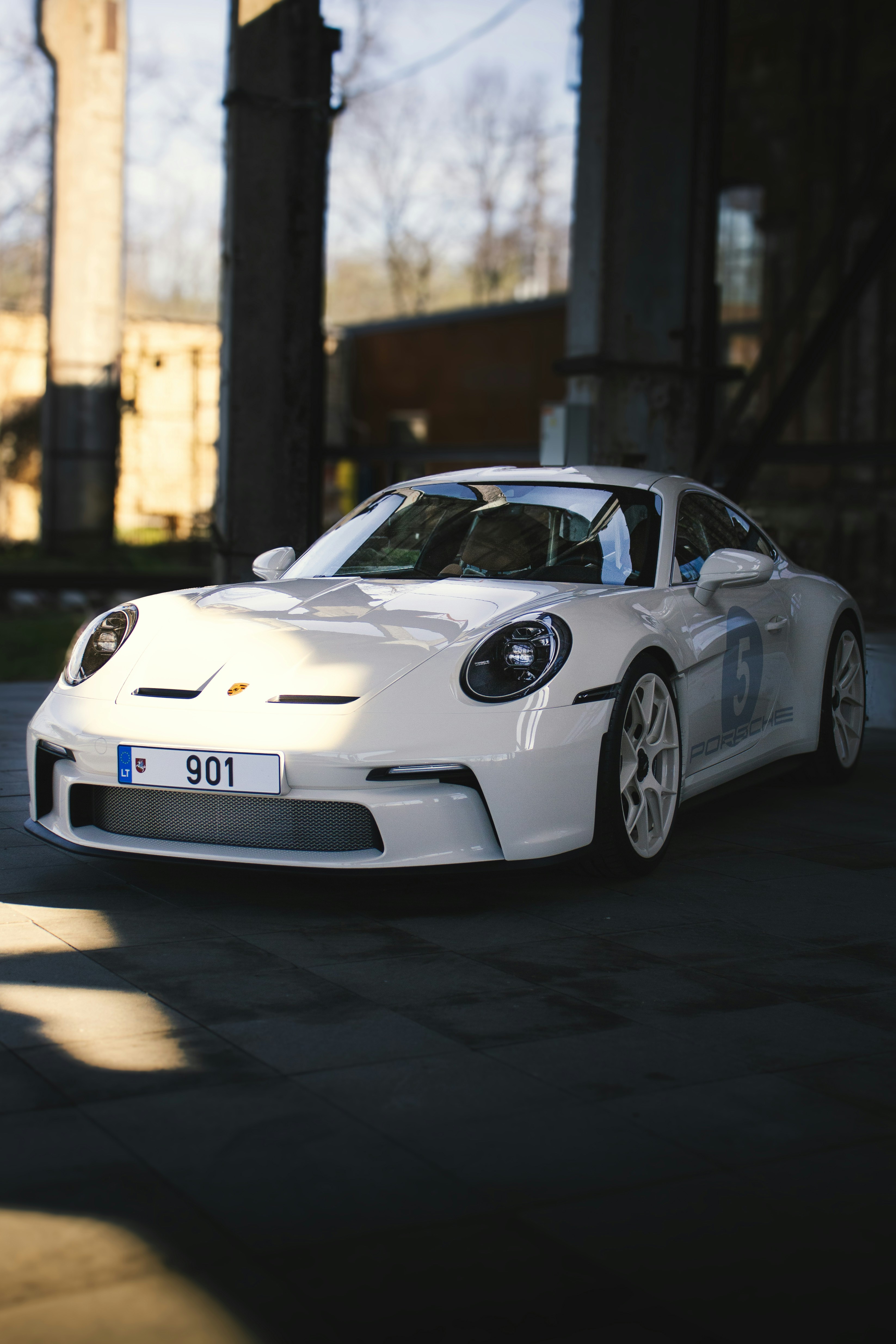White Porsche in Industrial Light and Shadow
