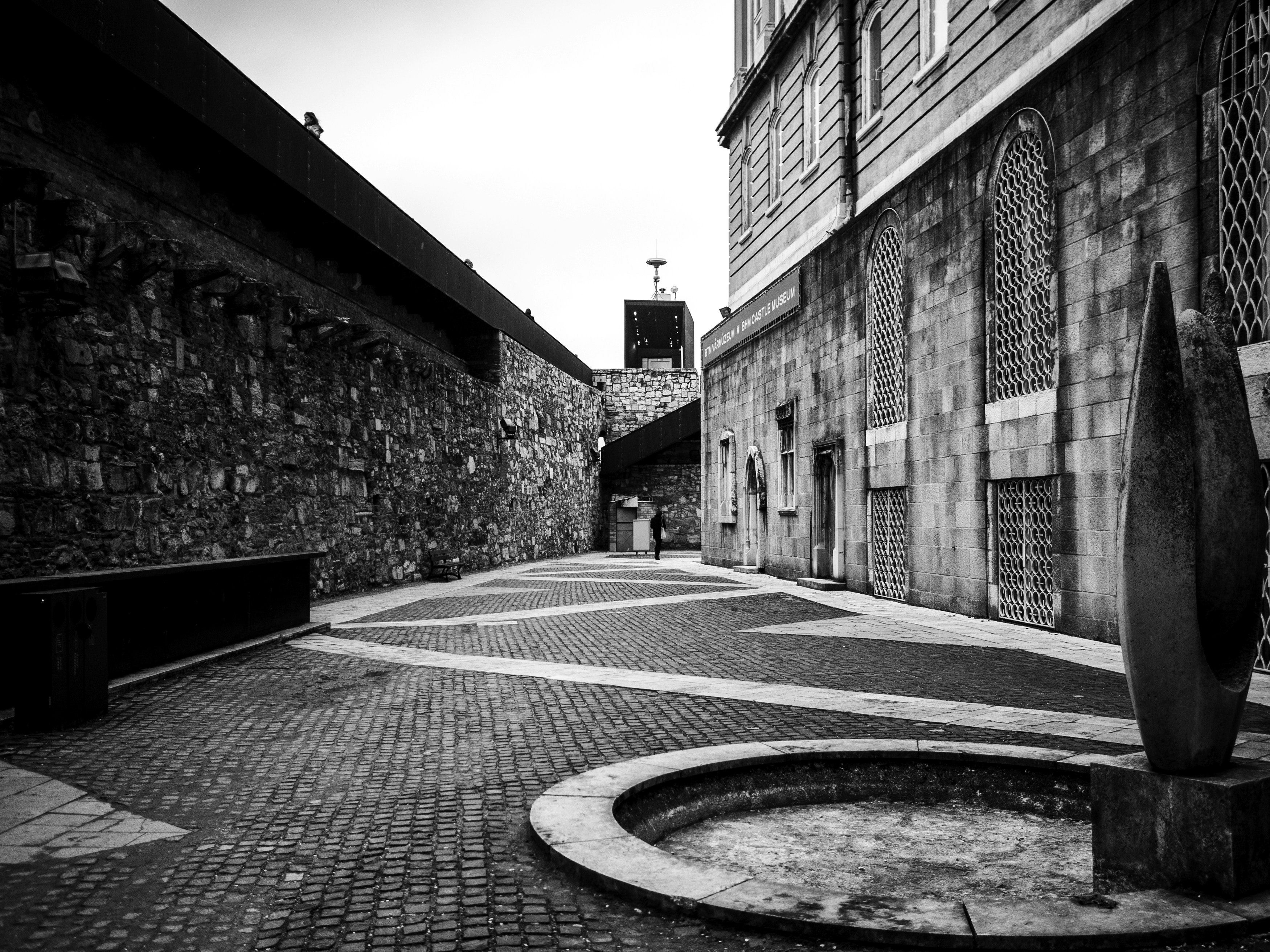Courtyard Echoes: A Quiet Walk Between Stone Walls