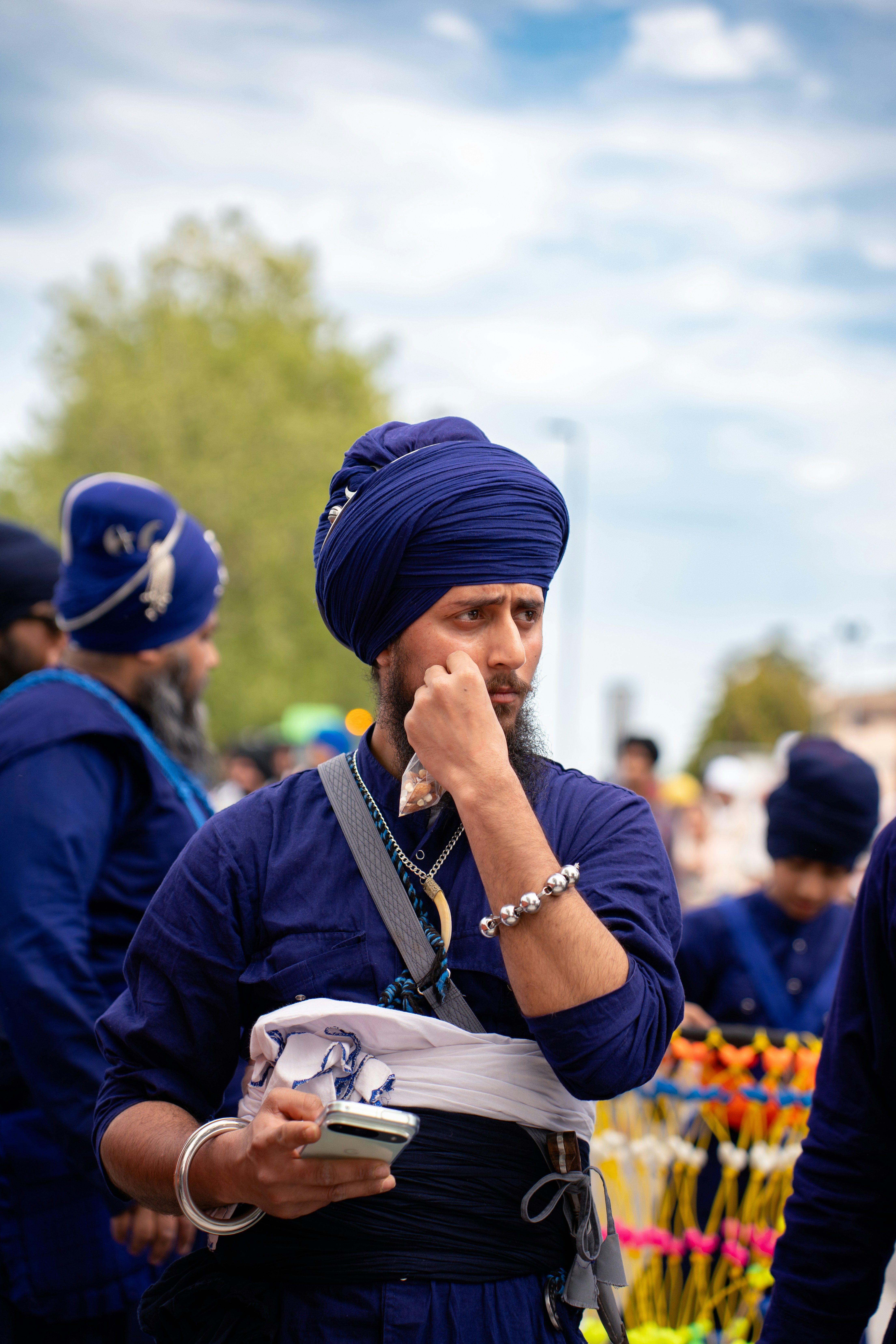 Blue Turban, Quiet Focus: A Moment Between Signals