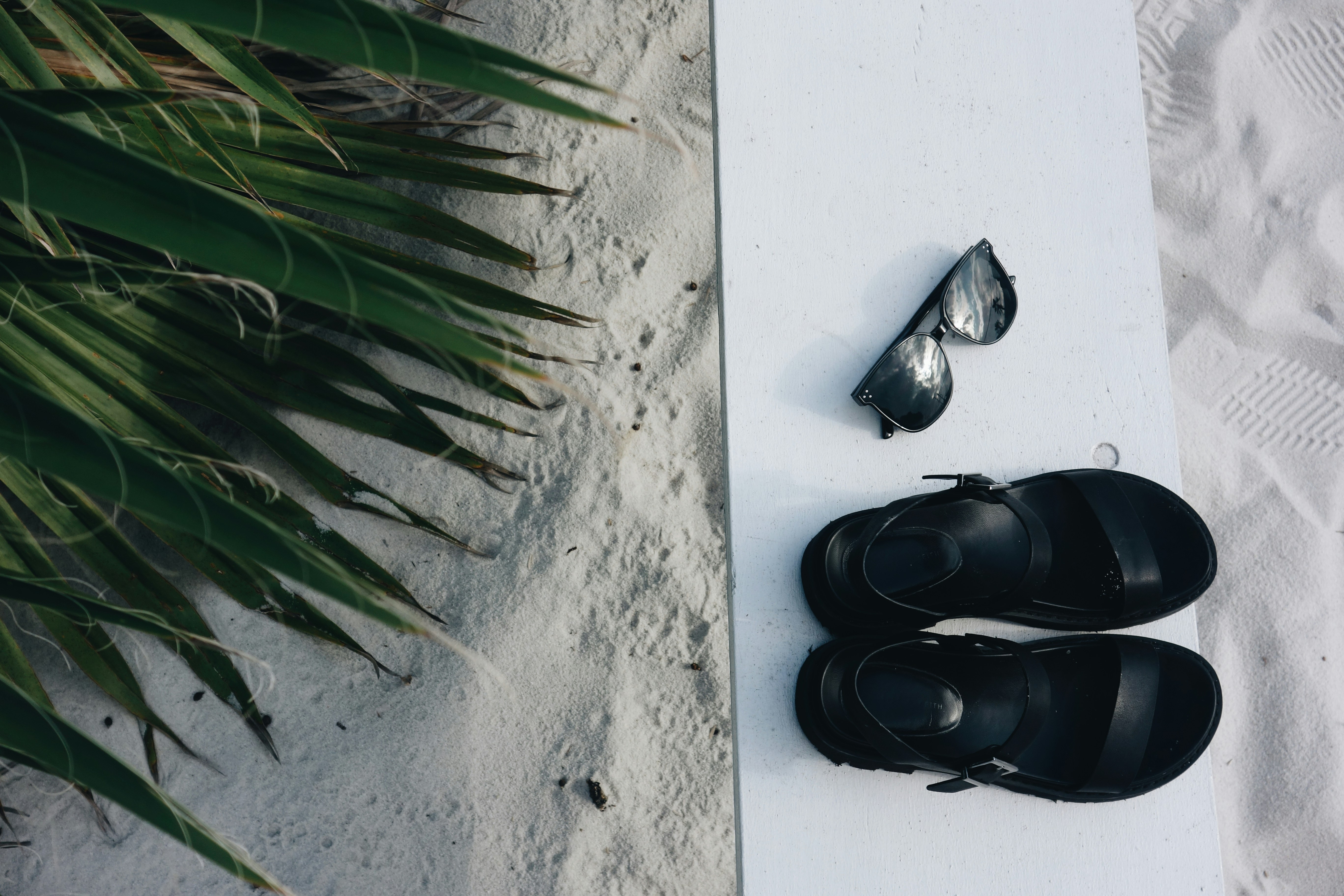 Beachside Gear Resting on White Plank