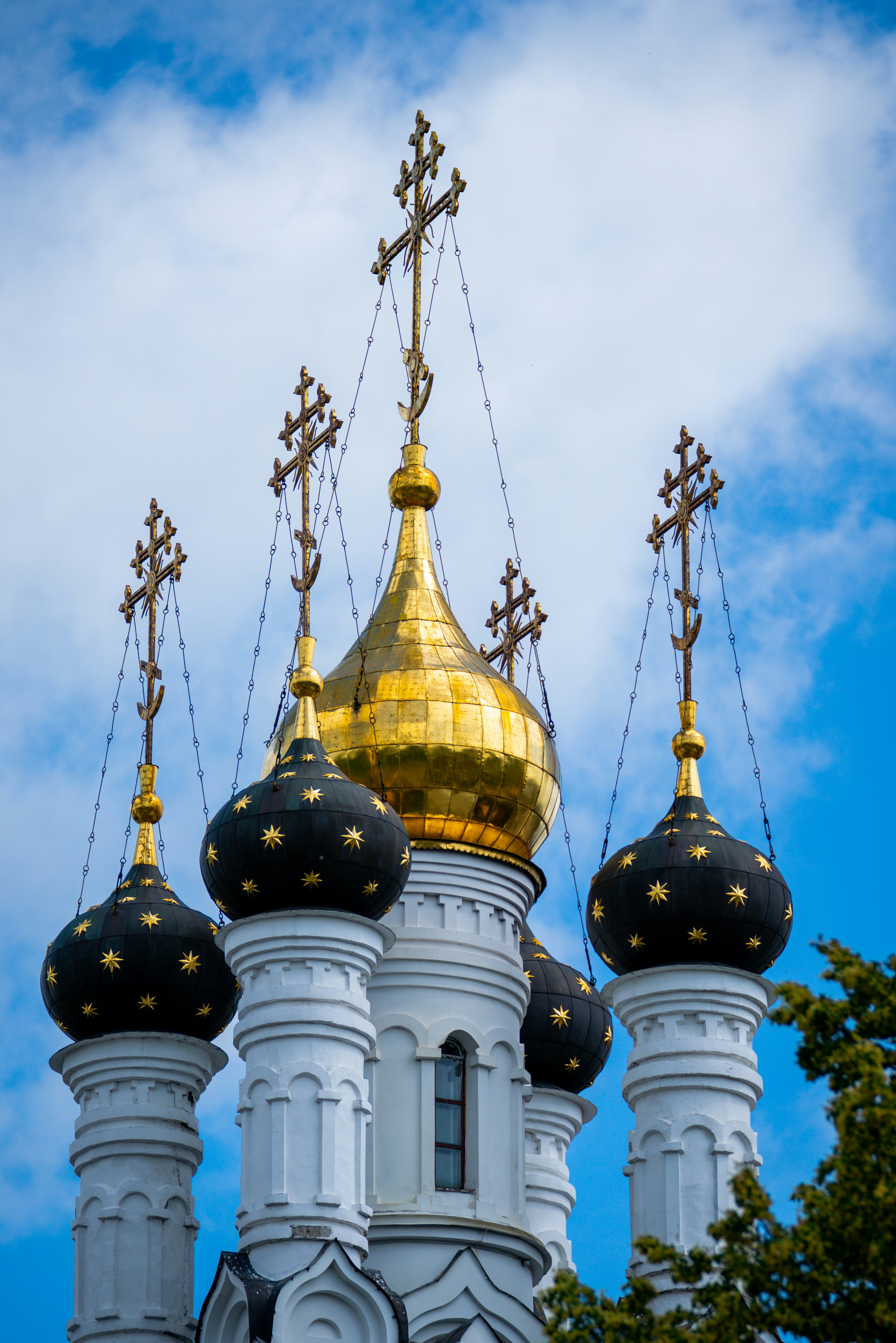 Golden Dome Rising: Onion Domes Beneath a Bright Blue Sky