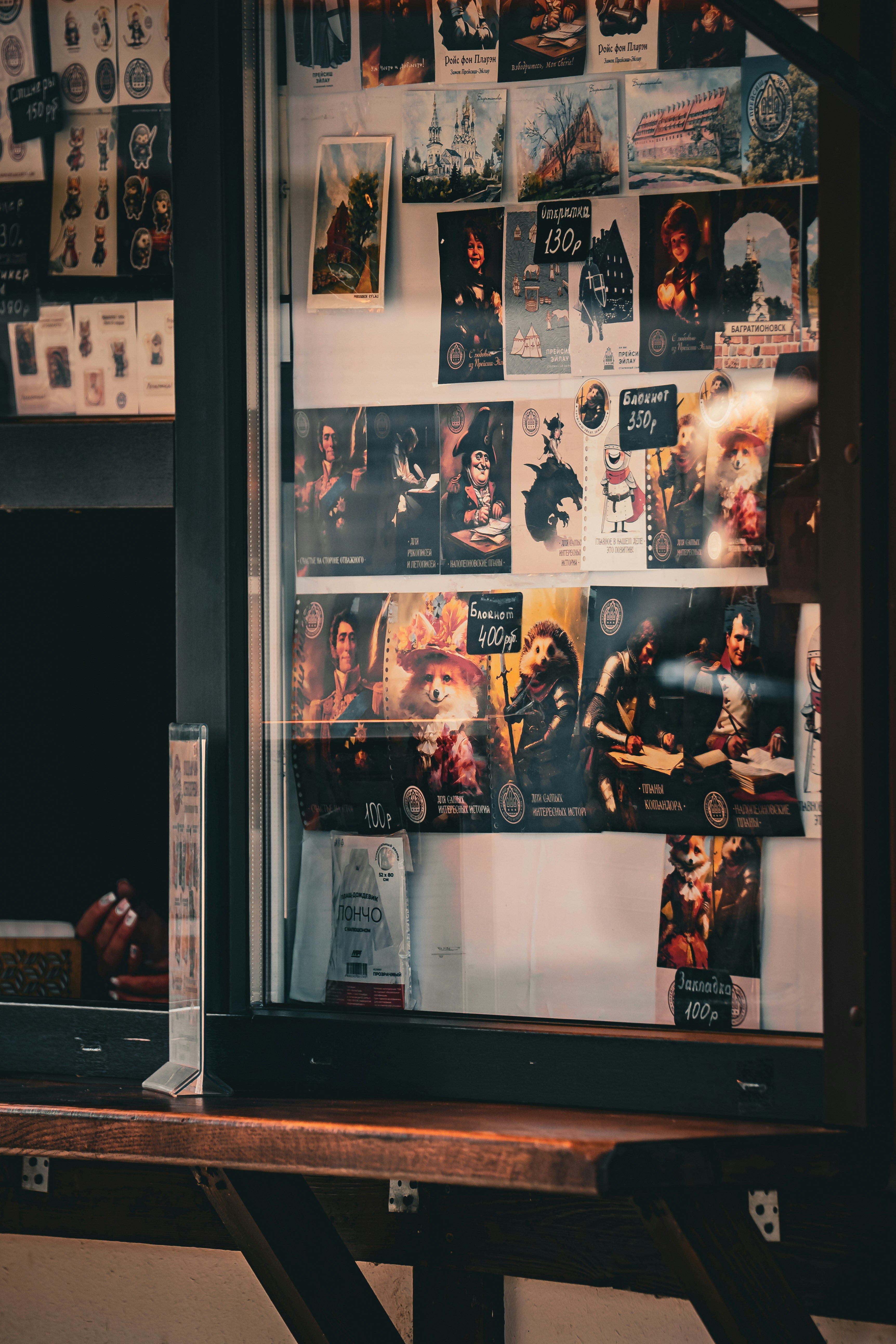 Street-side Poster Wall: Captured Collage of Theatrical Stills