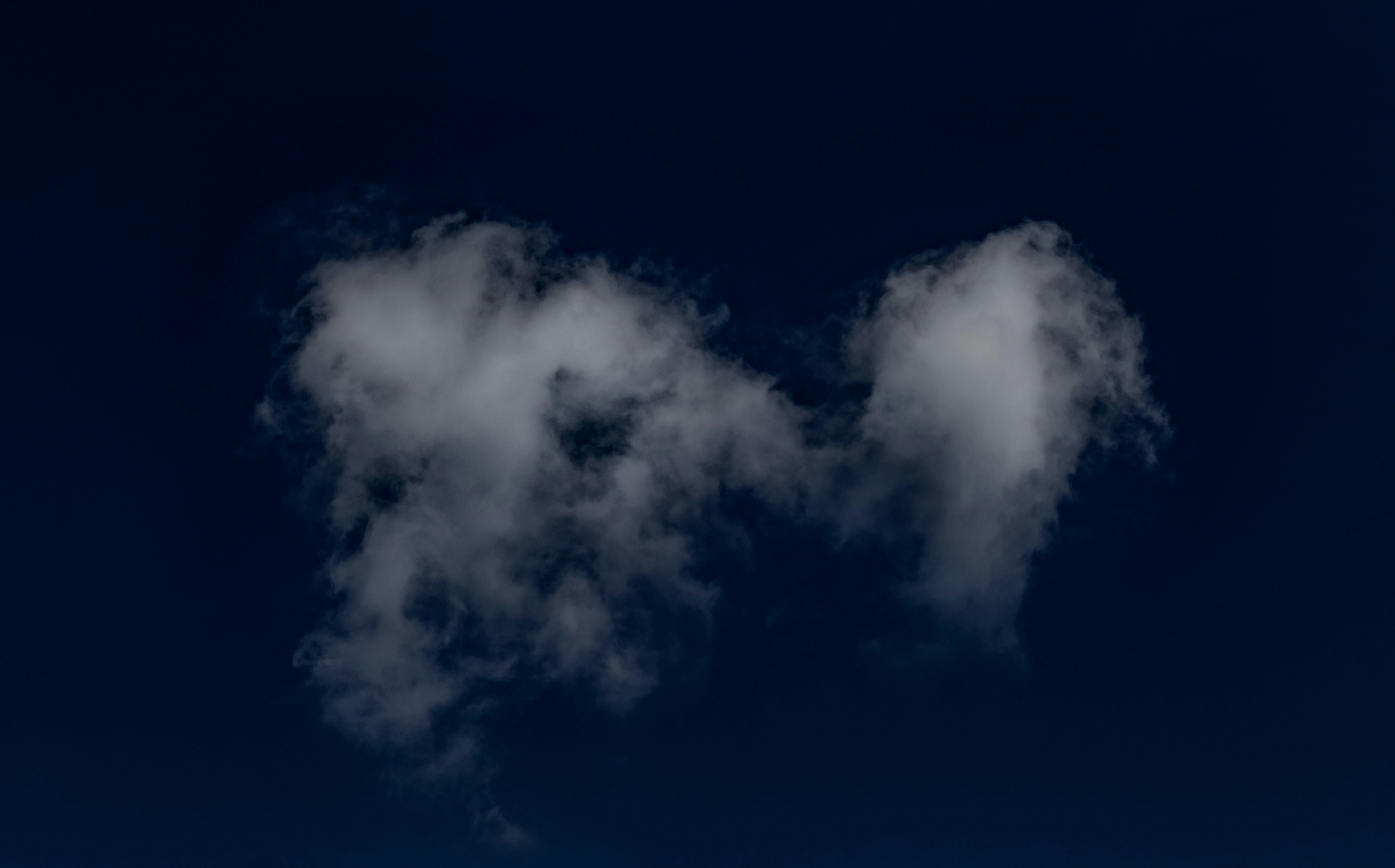 A Lone Cloud Against a Velvet Night