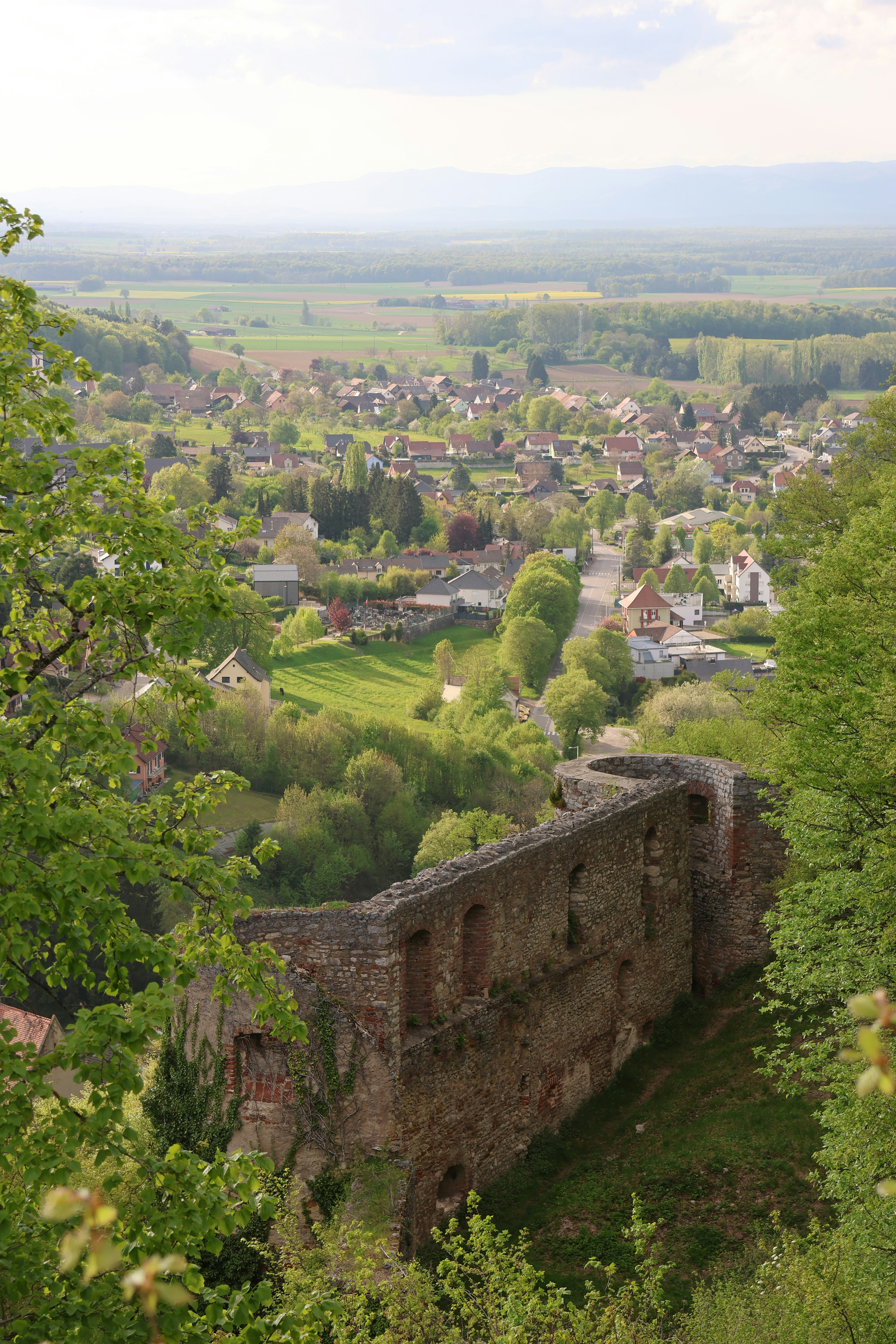 Ruin over Green Valley: A Village Beneath an Ancient Wall