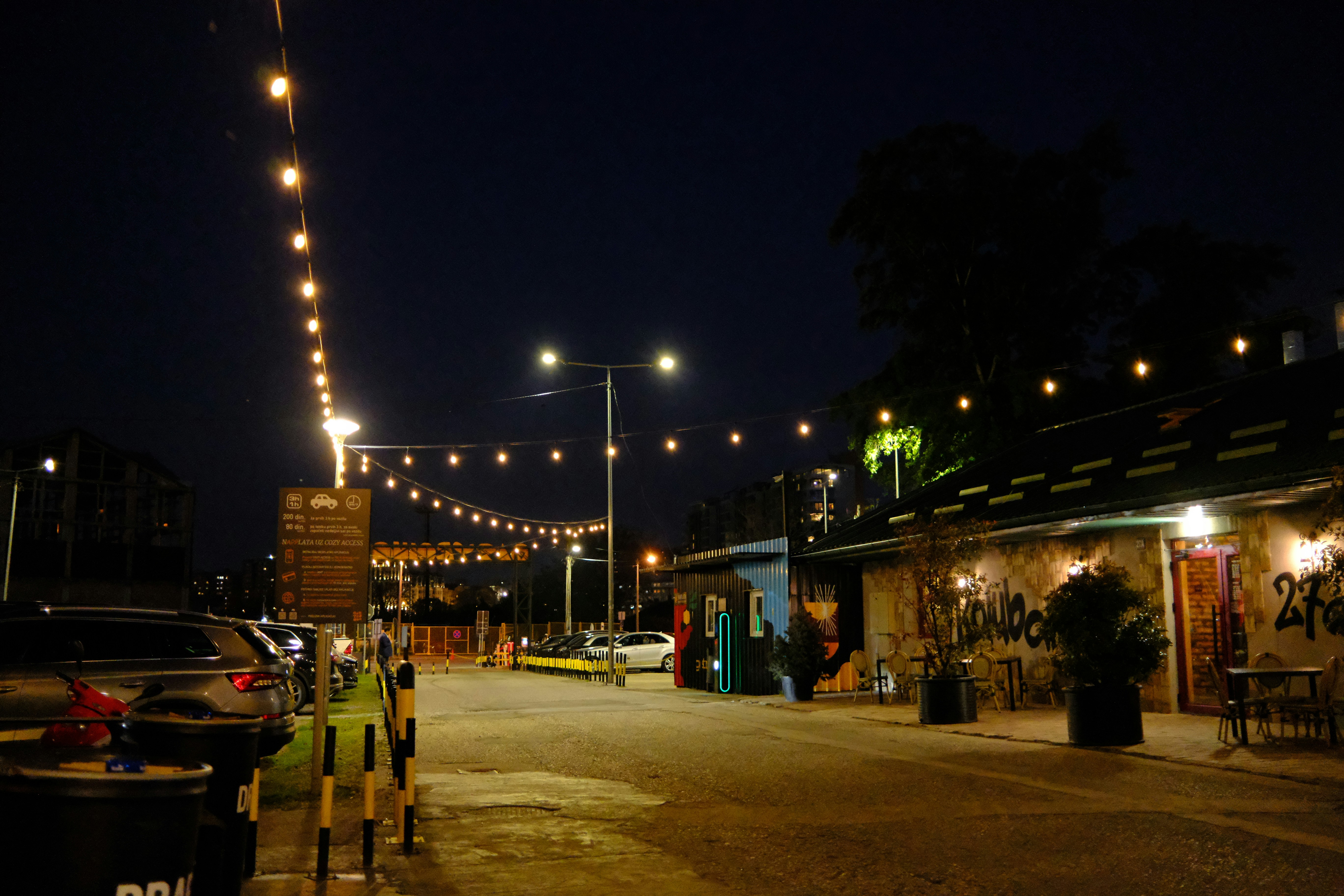 Night Bazaar Under String Lights: A Quiet Street Café Scene