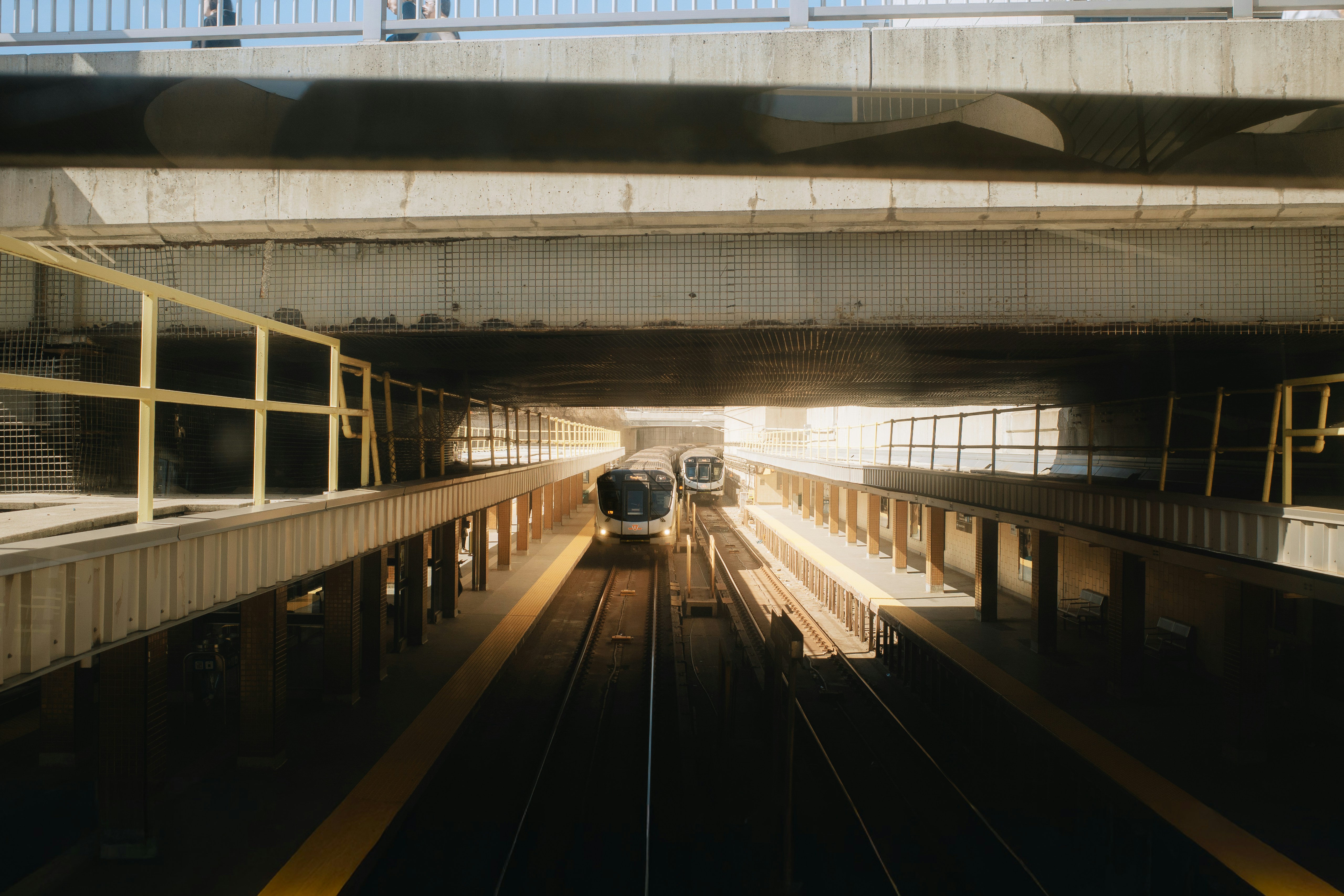 Converging Rails under Urban Light