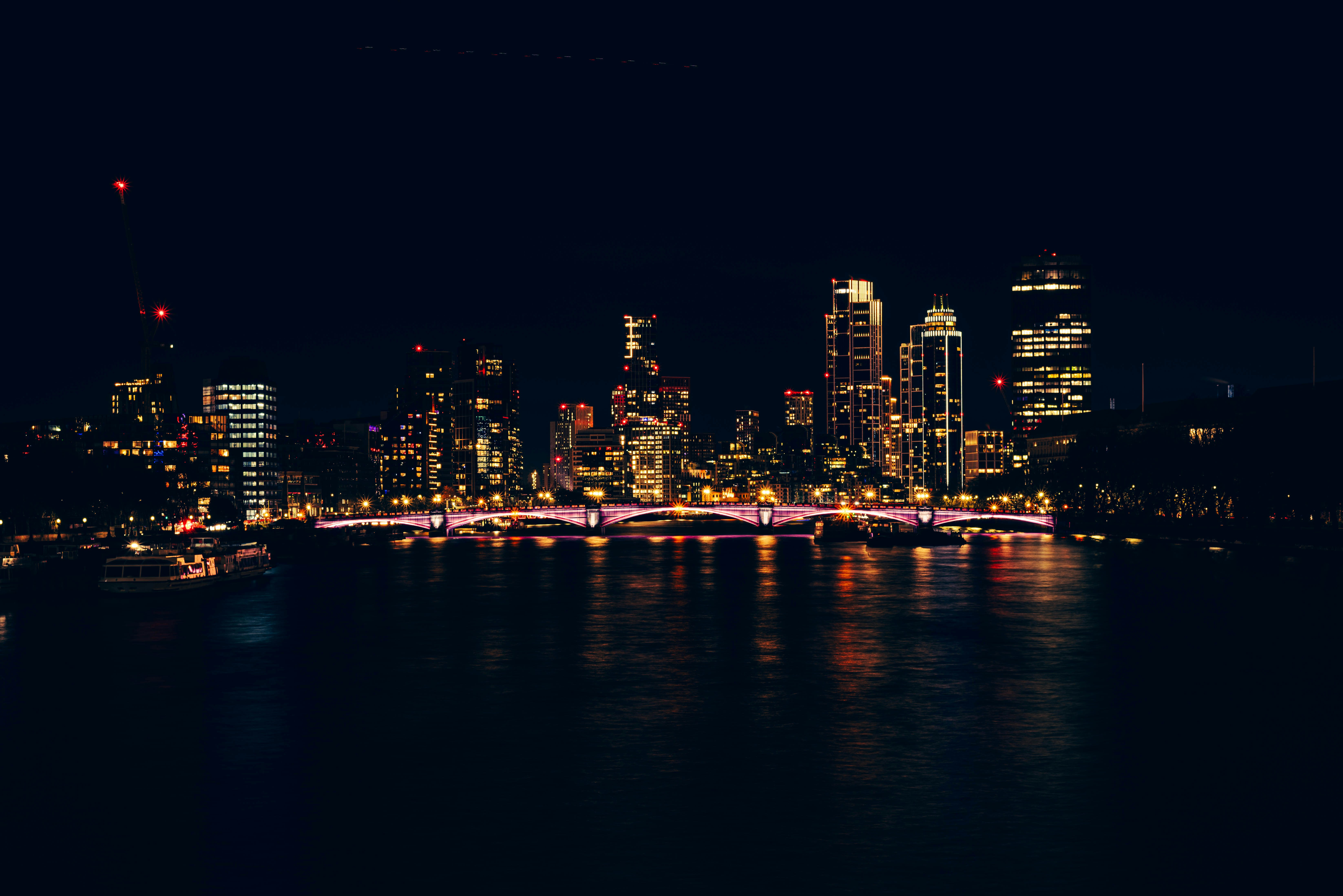 Midnight Marina: City Lights Reflections Across calm water
