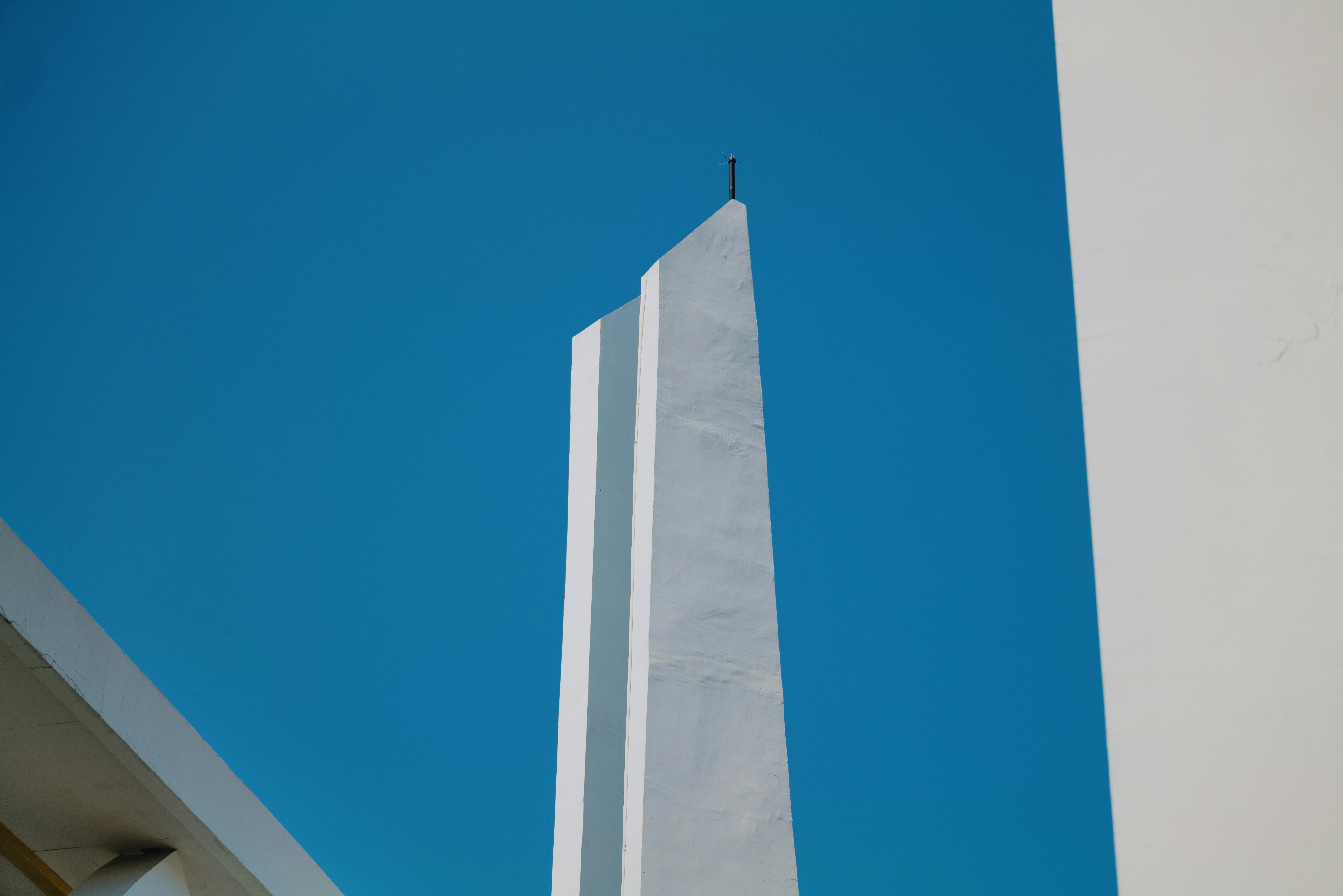 Vertical Monument Against a Clear Blue Sky